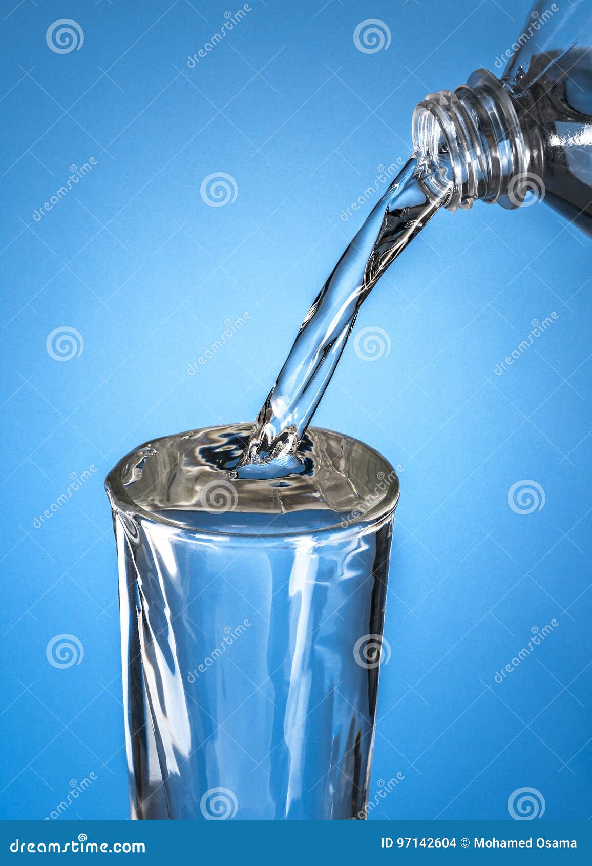 Bottle of Water Pouring in Glass Stock Photo - Image of aqua, cold ...