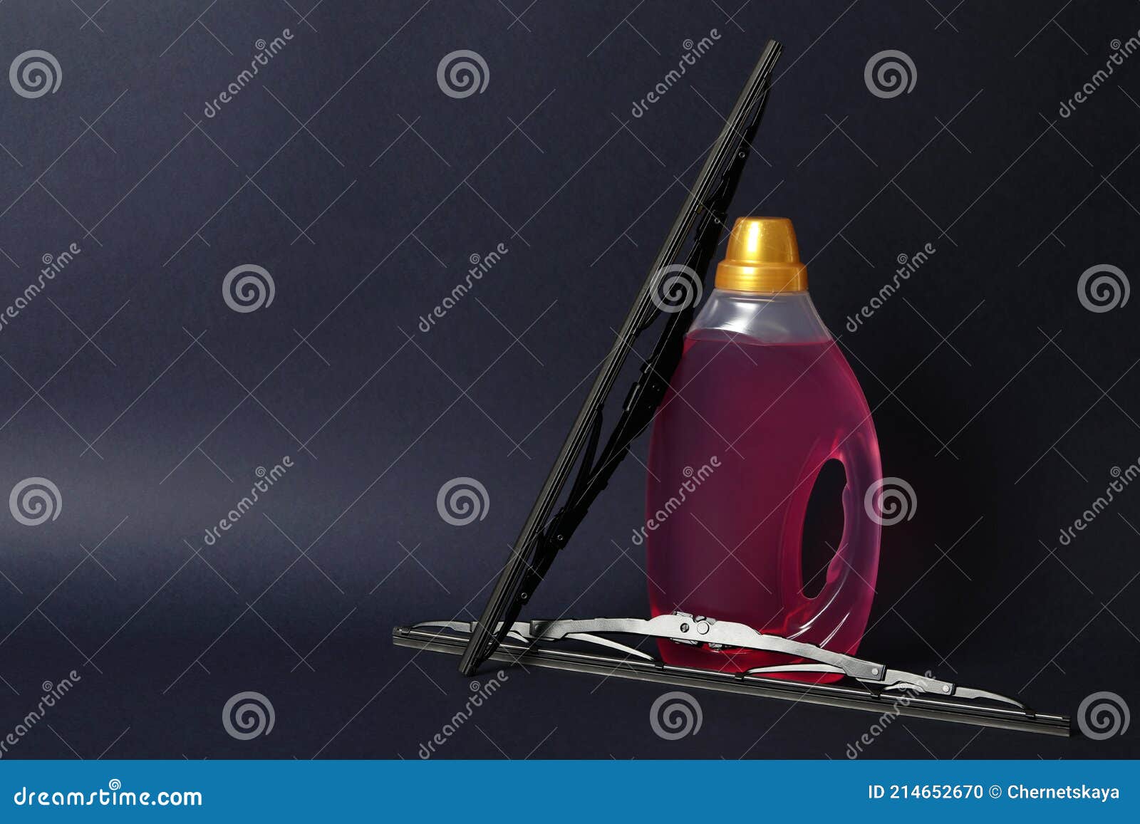 Bottle Of Windshield Washer Fluid And Wiper On White Background Stock ...
