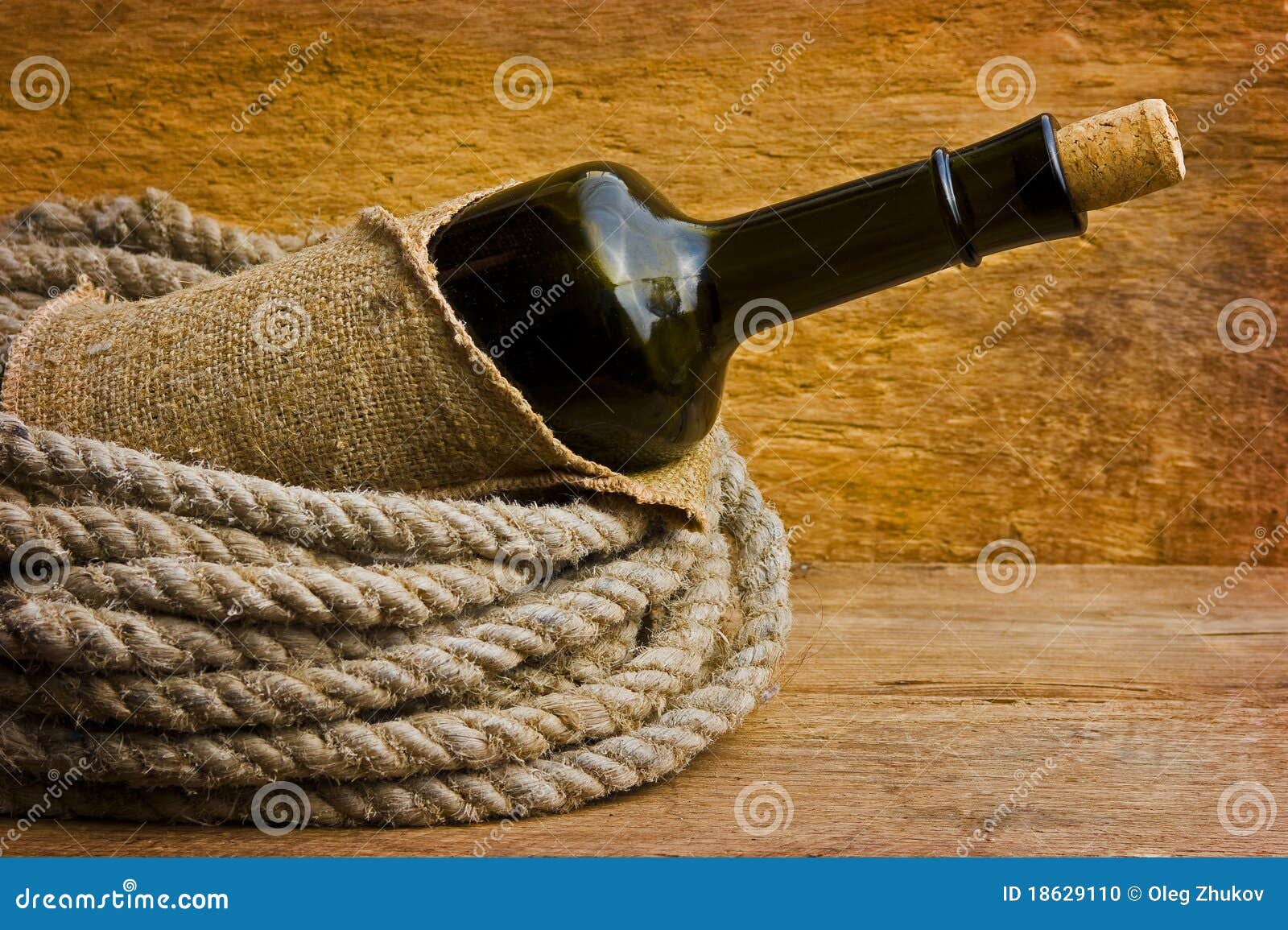 Bottle wrapped with rope stock photo. Image of wooden - 18629110