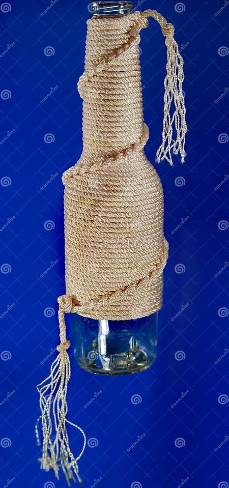 Bottle wrapped in rope stock photo. Image of strands, covering - 1945700