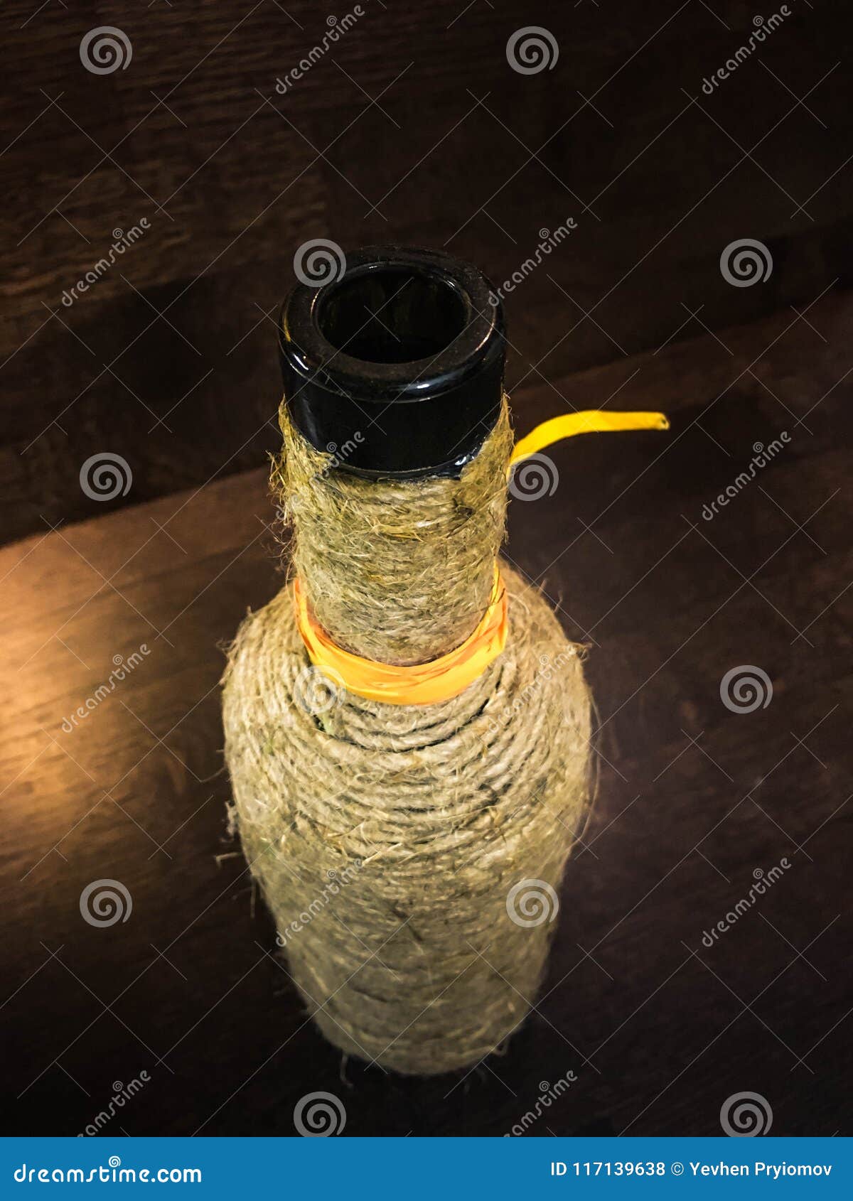 A Bottle Wrapped in String with Orange Stripes Stock Photo - Image of ...