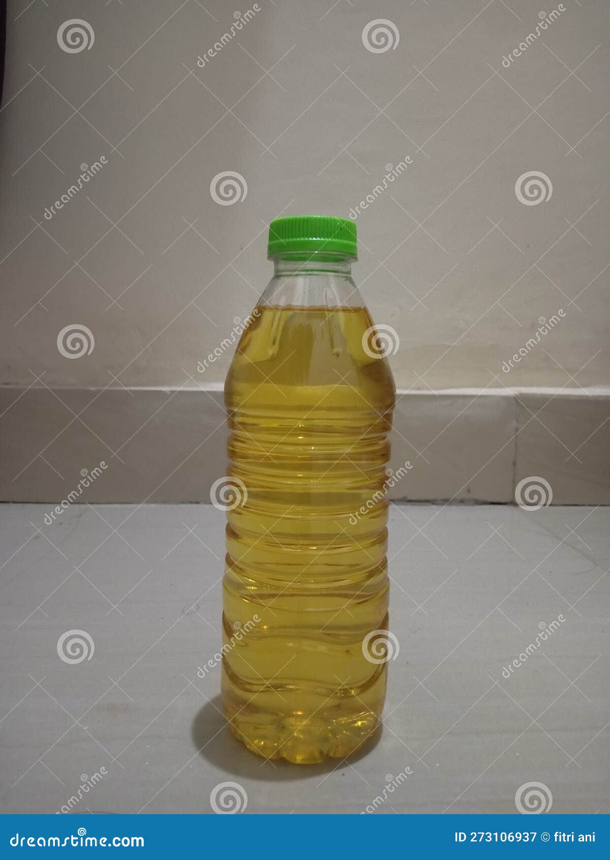 Bottled golden cooking oil stock image. Image of cooking - 273106937