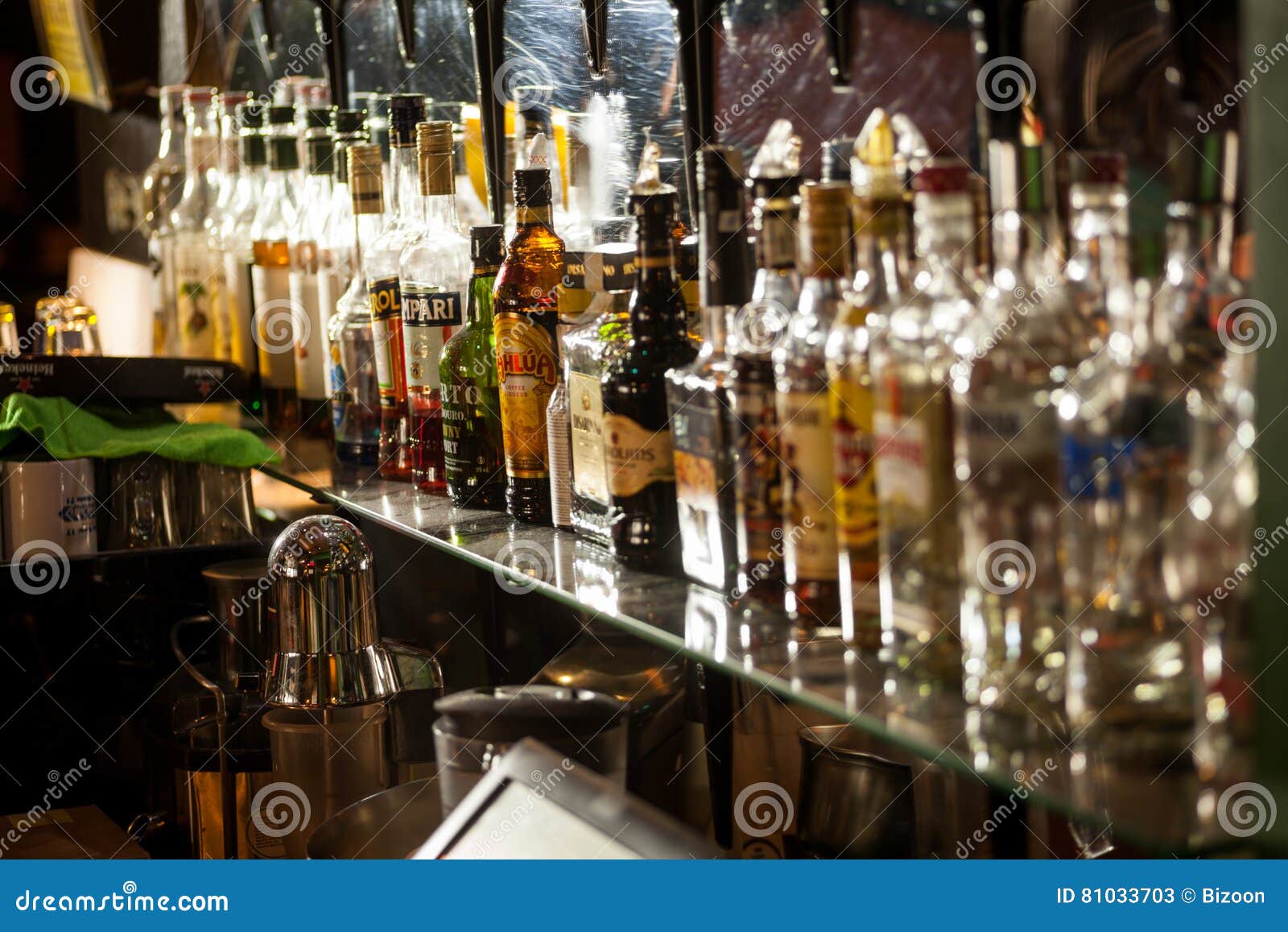 Bottles of alcohol editorial stock photo. Image of tavern - 81033703
