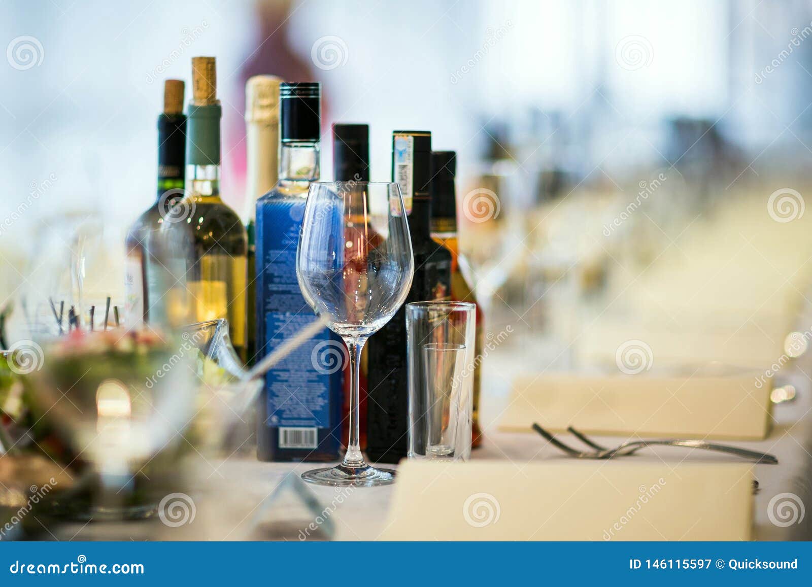 Bottles of Alcohol on a Party Table Stock Image - Image of glasses ...
