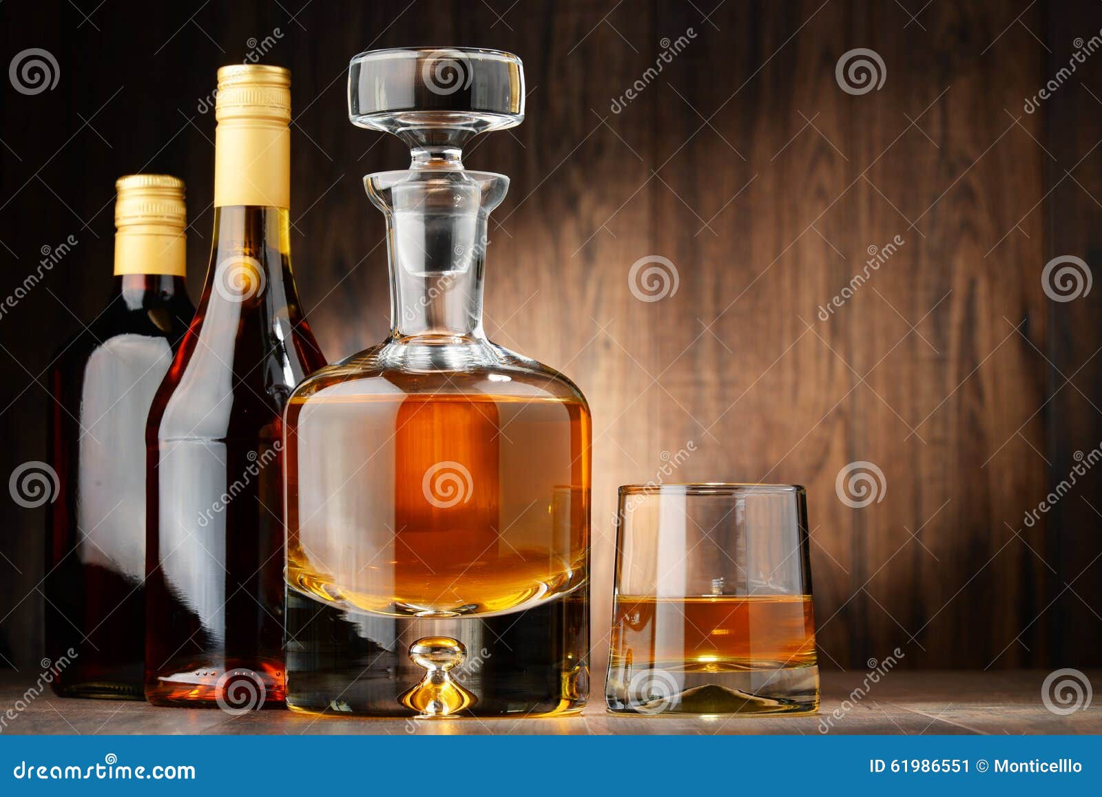 Bottles of Assorted Alcoholic Beverages and Glass of Whisky Stock Image ...
