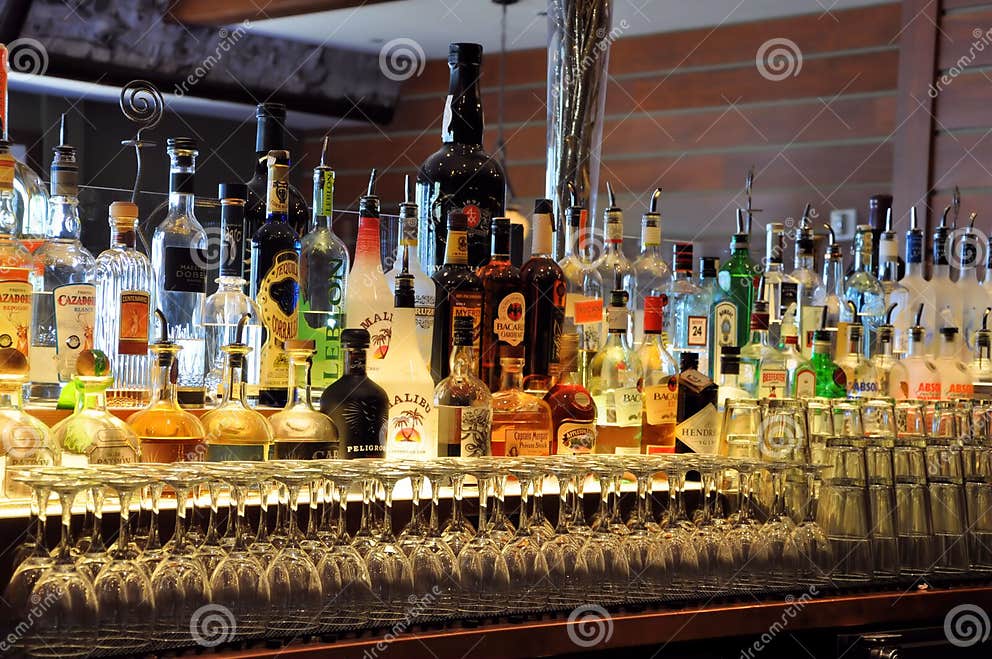 Bottles at a bar editorial stock photo. Image of english - 22983283