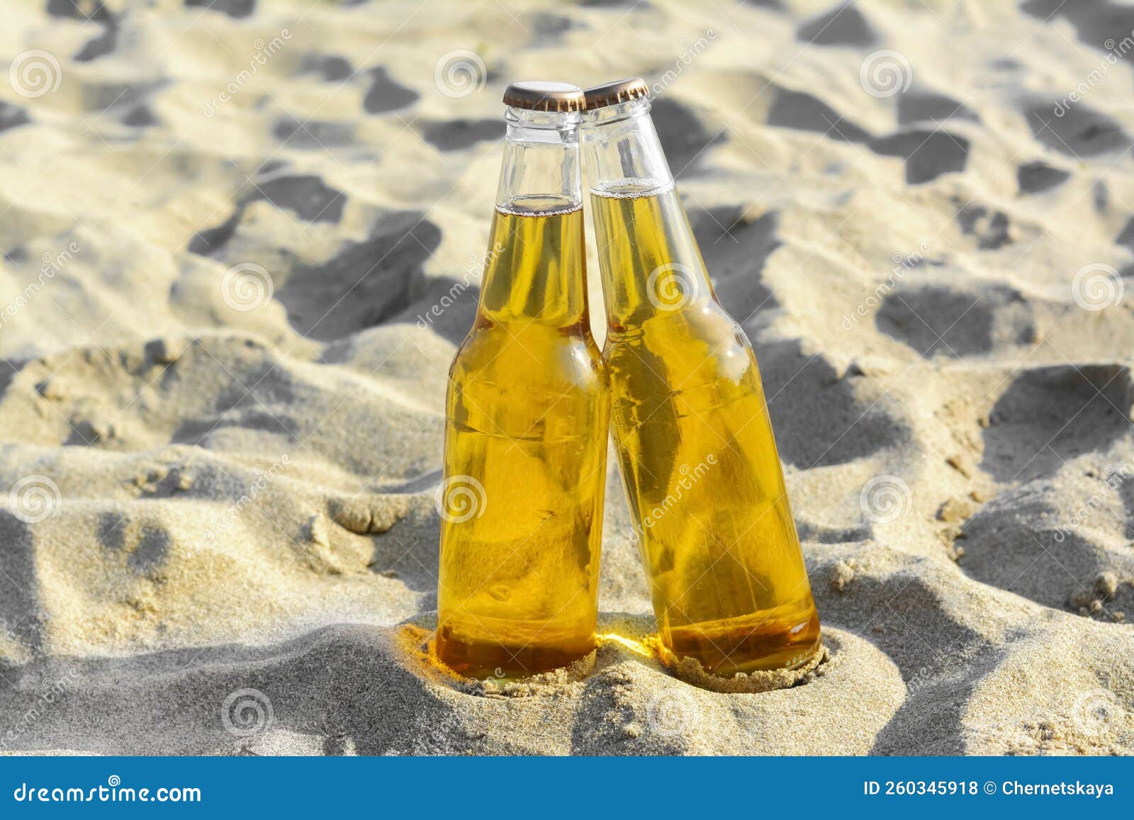 Bottles of Cold Beer on Sandy Beach Stock Photo - Image of cold, beer ...
