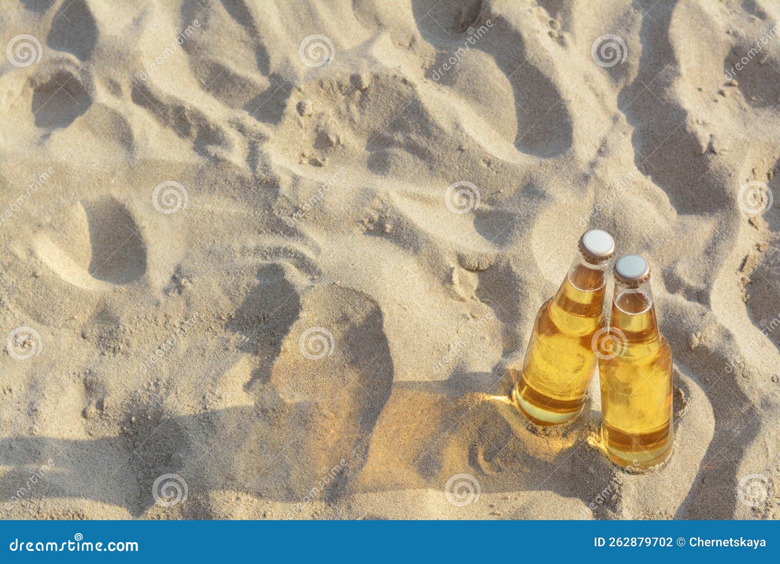 Bottles of Cold Beer on Sandy Beach, Above View. Space for Text Stock ...