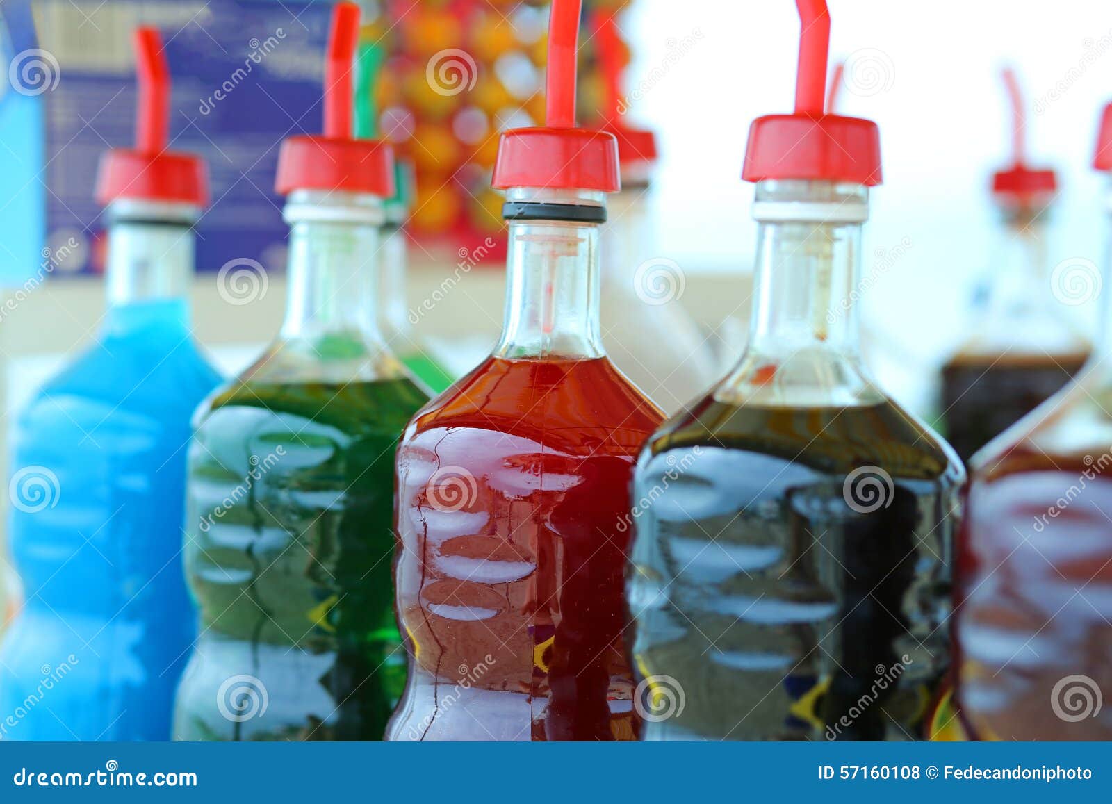 Bottles of Colored Syrup for Preparing Ice Creams in Summer on T Stock ...