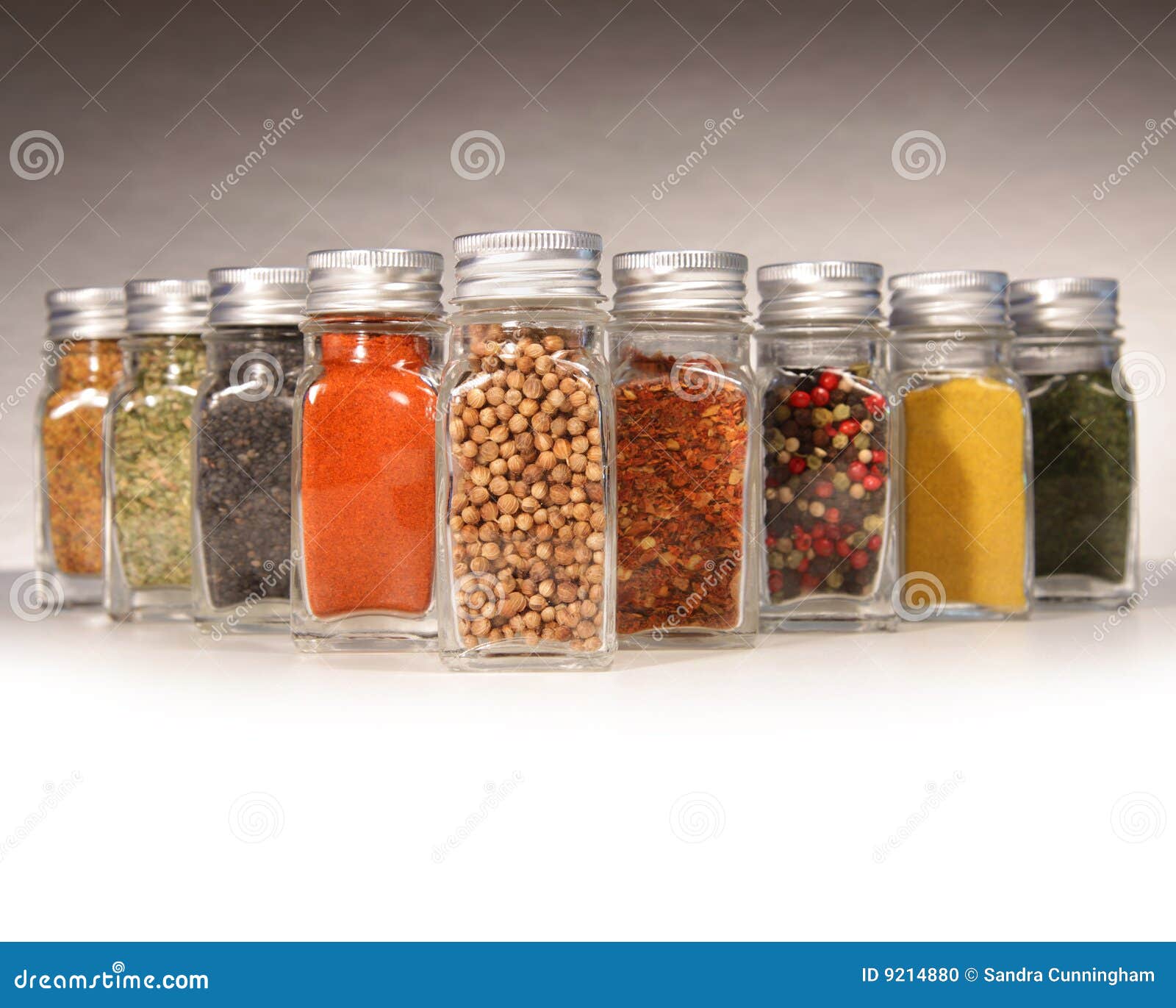 Bottles of Colorful Spices with Grey Stock Photo - Image of color ...