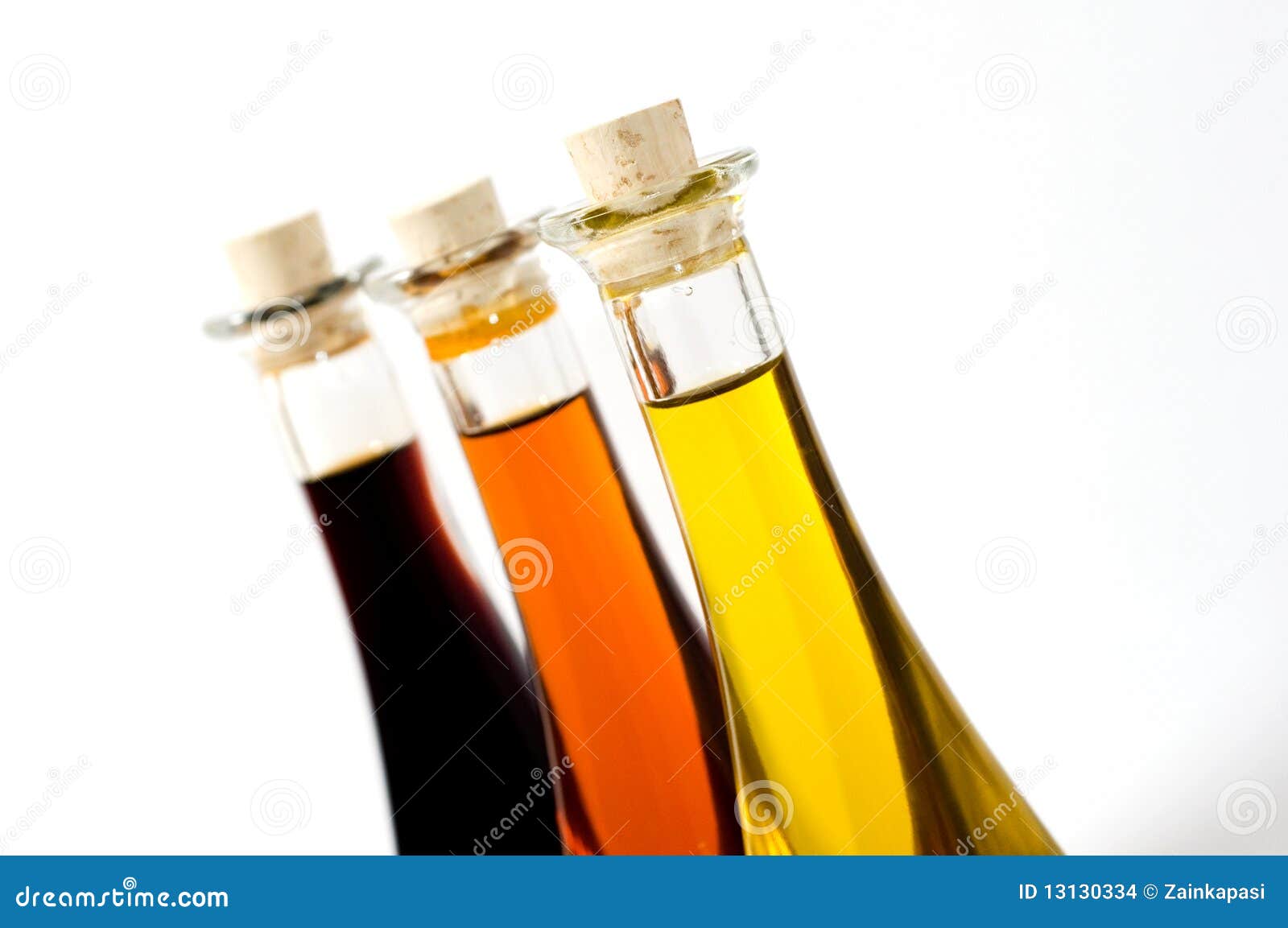 Bottles of Coloured Oils Isolated on White Stock Photo - Image of ...