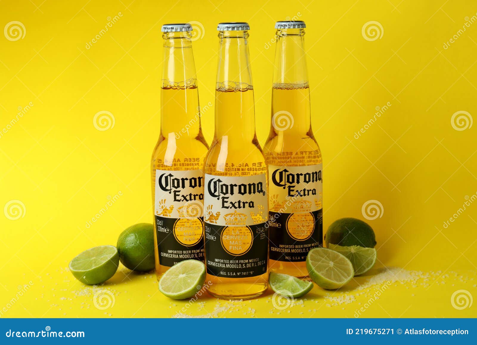 Bottles of Corona Extra, Limes and Salt on Yellow Background Editorial ...