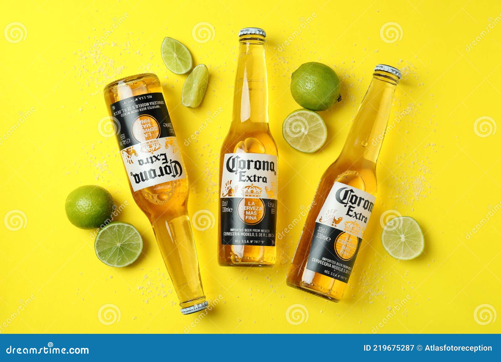 Bottles of Corona Extra, Limes and Salt on Yellow Background Editorial ...
