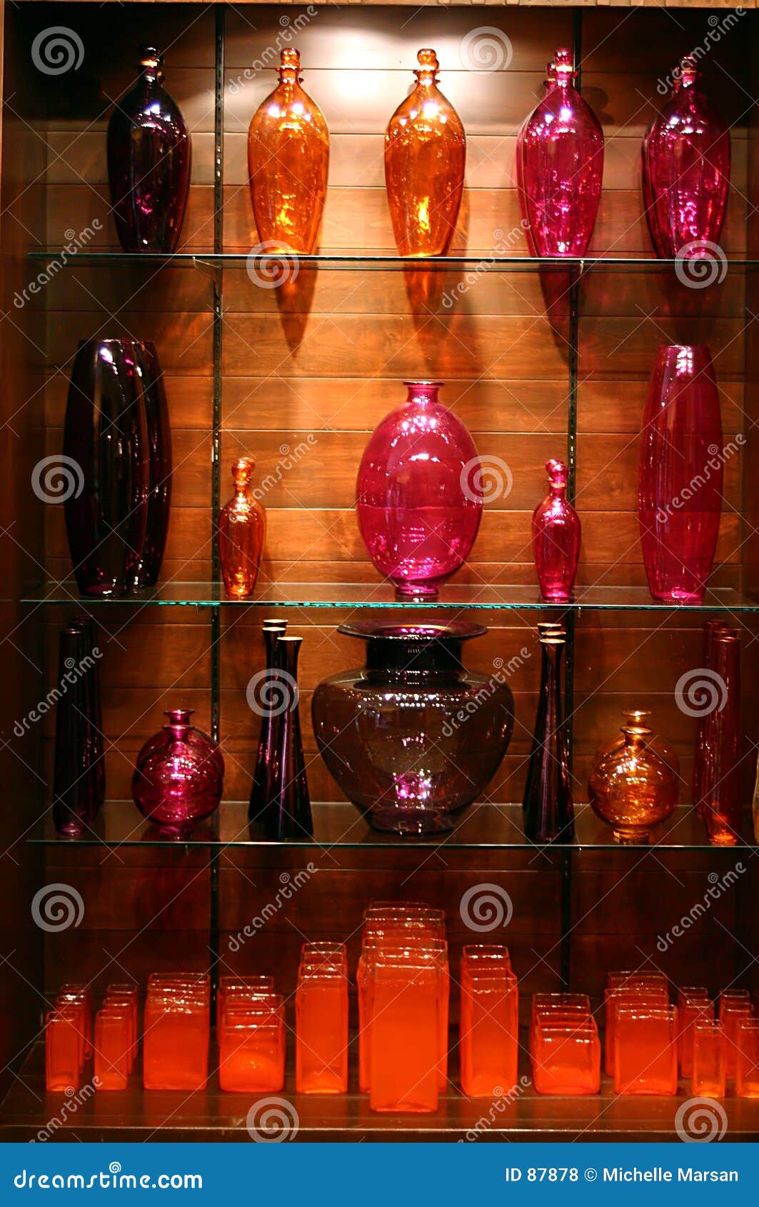 Bottles on Display stock photo. Image of display, glow, colored - 87878