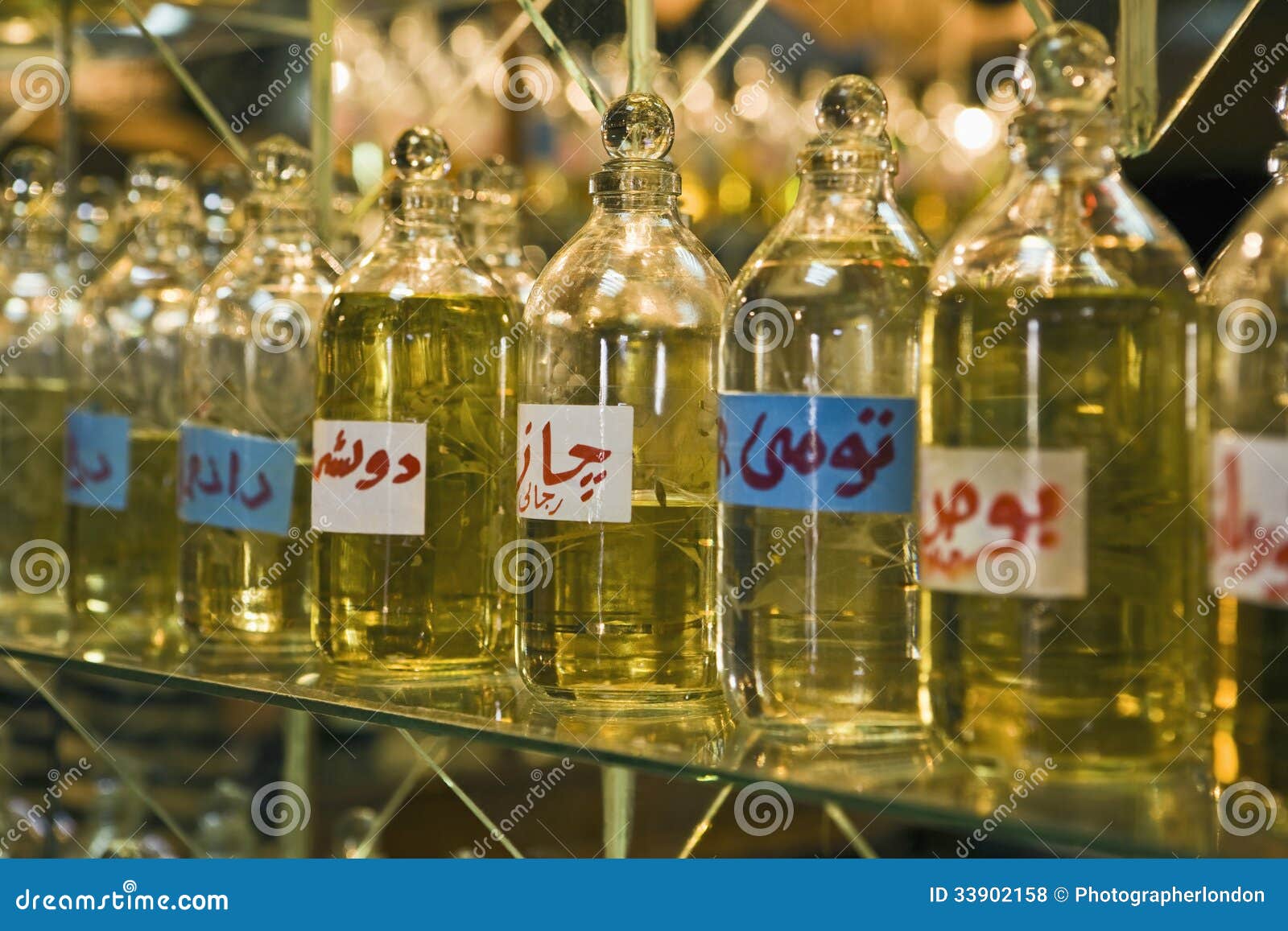 Bottles of Essential Oils on Display Stock Photo - Image of perfume ...