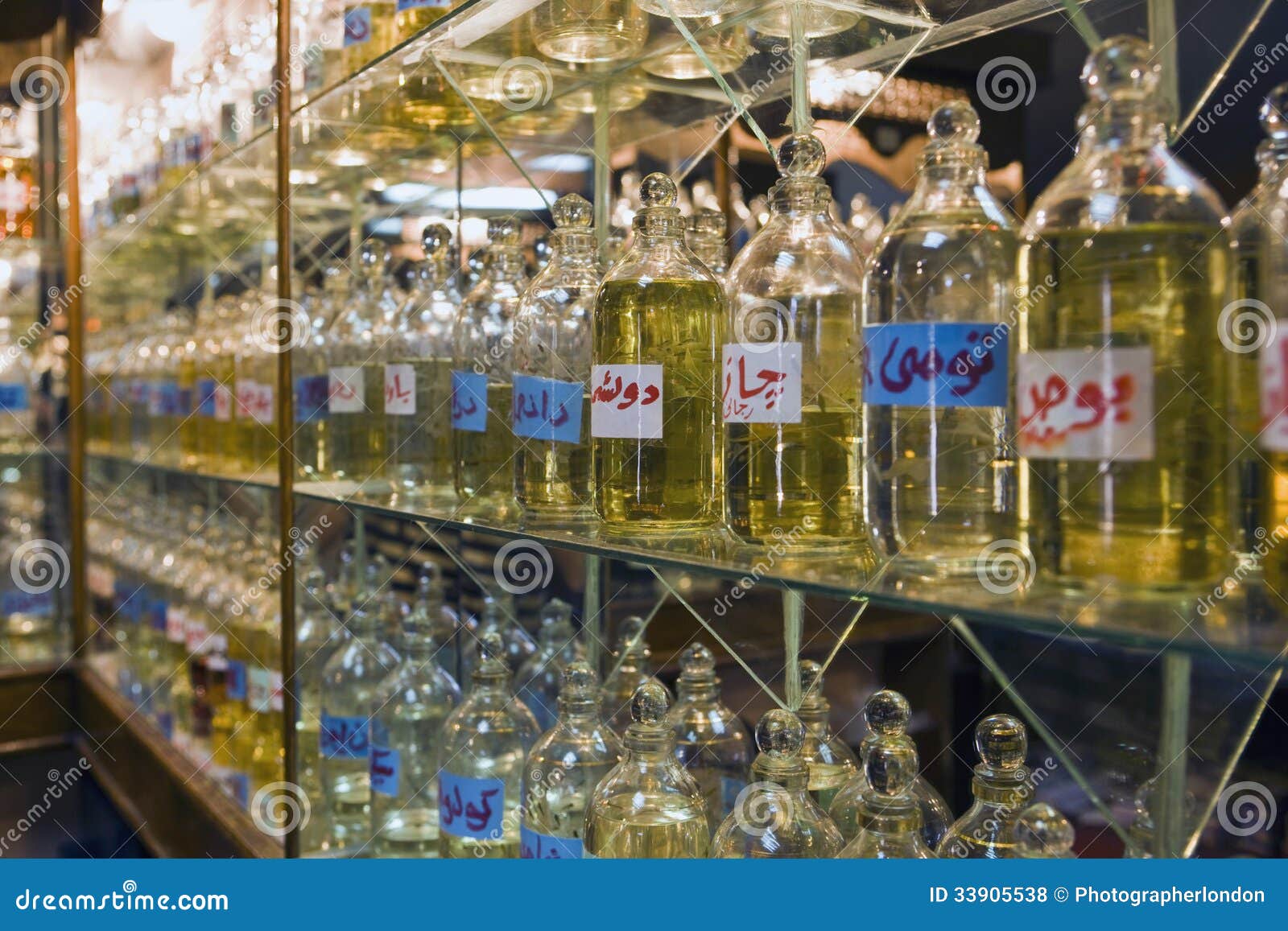 Bottles of Essential Oils on Display Stock Photo - Image of market ...