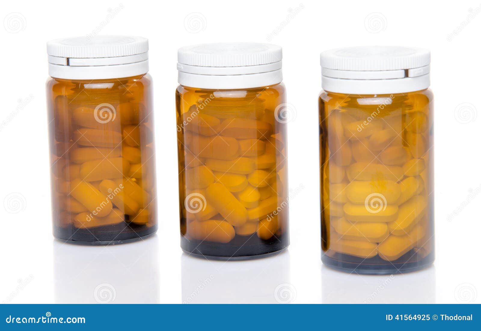Bottles full of pills stock image. Image of group, bottle - 41564925