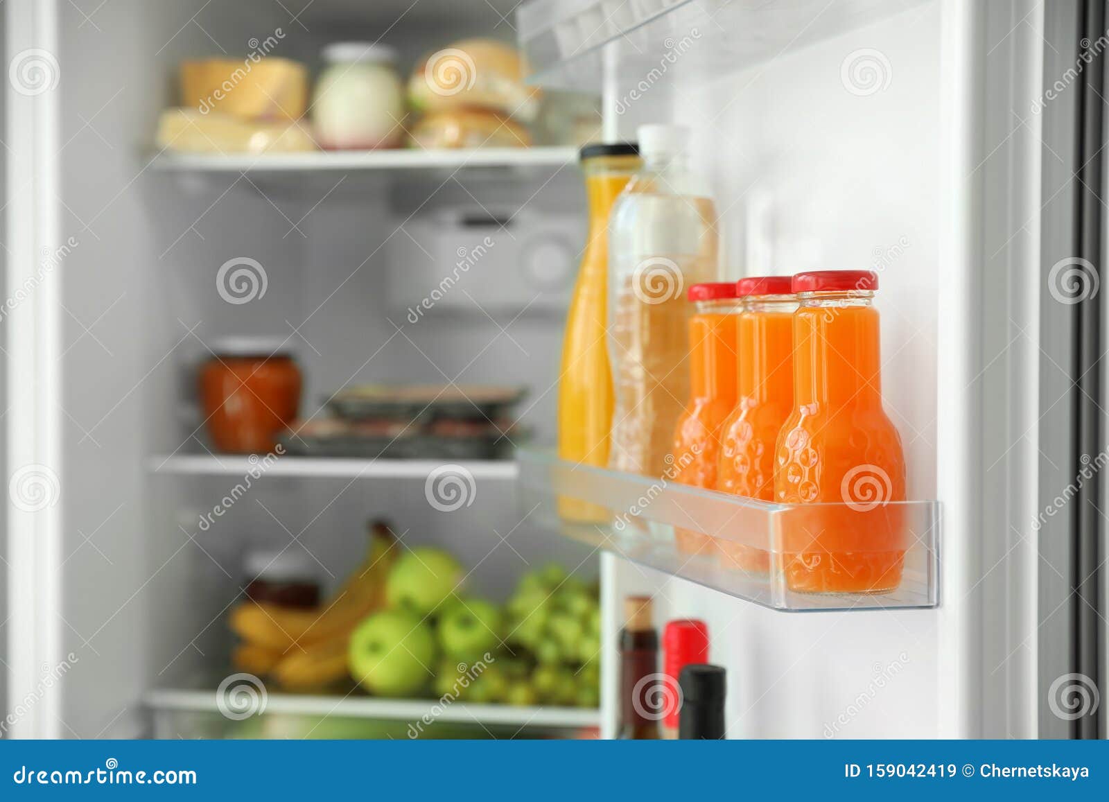 Bottles of Juice in Refrigerator Stock Image - Image of food, inside ...