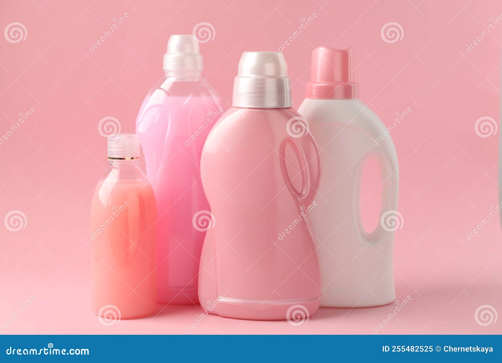 Bottles of Laundry Detergents on Pink Background Stock Image - Image of ...