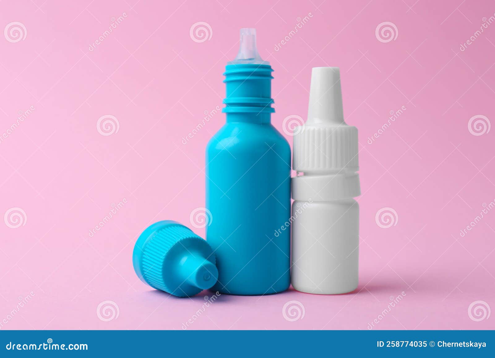 Bottles of Medical Drops on Pink Background Stock Image - Image of ...