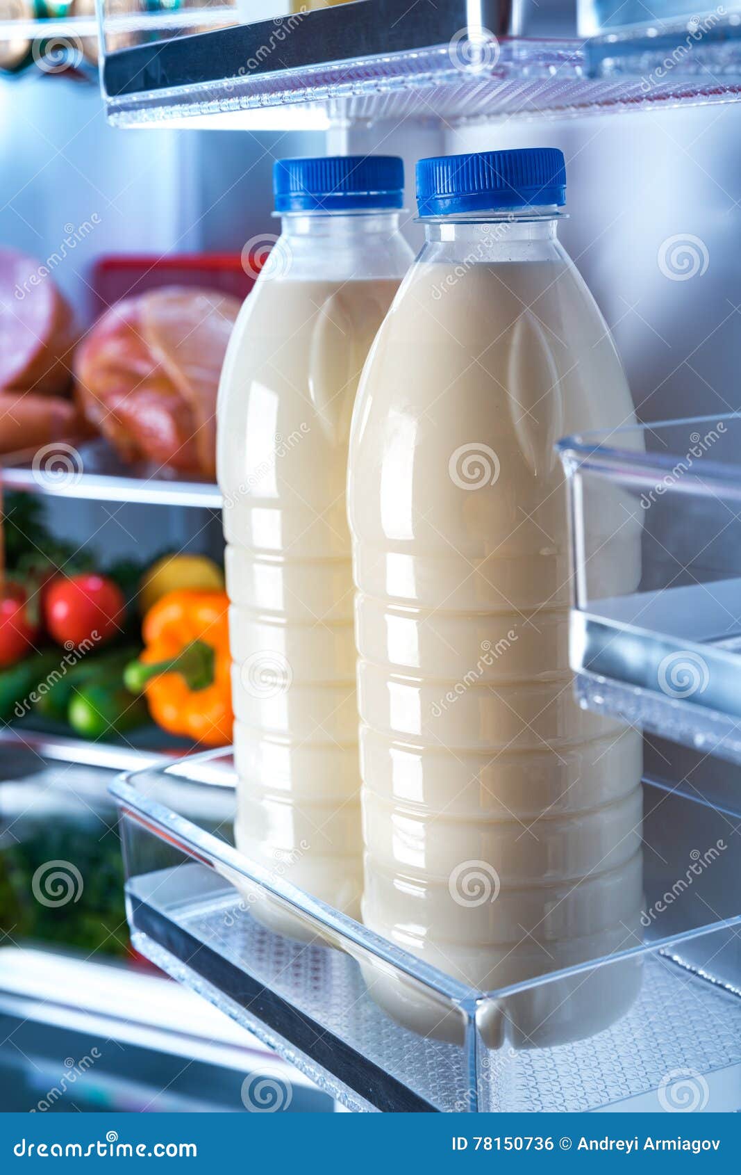 Bottles of Milk in the Fridge Stock Photo - Image of fluid, fruit: 78150736