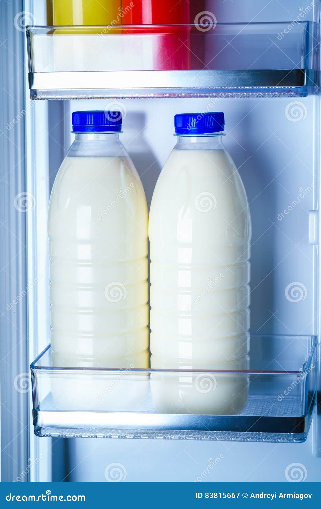Bottles of Milk in the Fridge Stock Image - Image of fridge, fluid ...