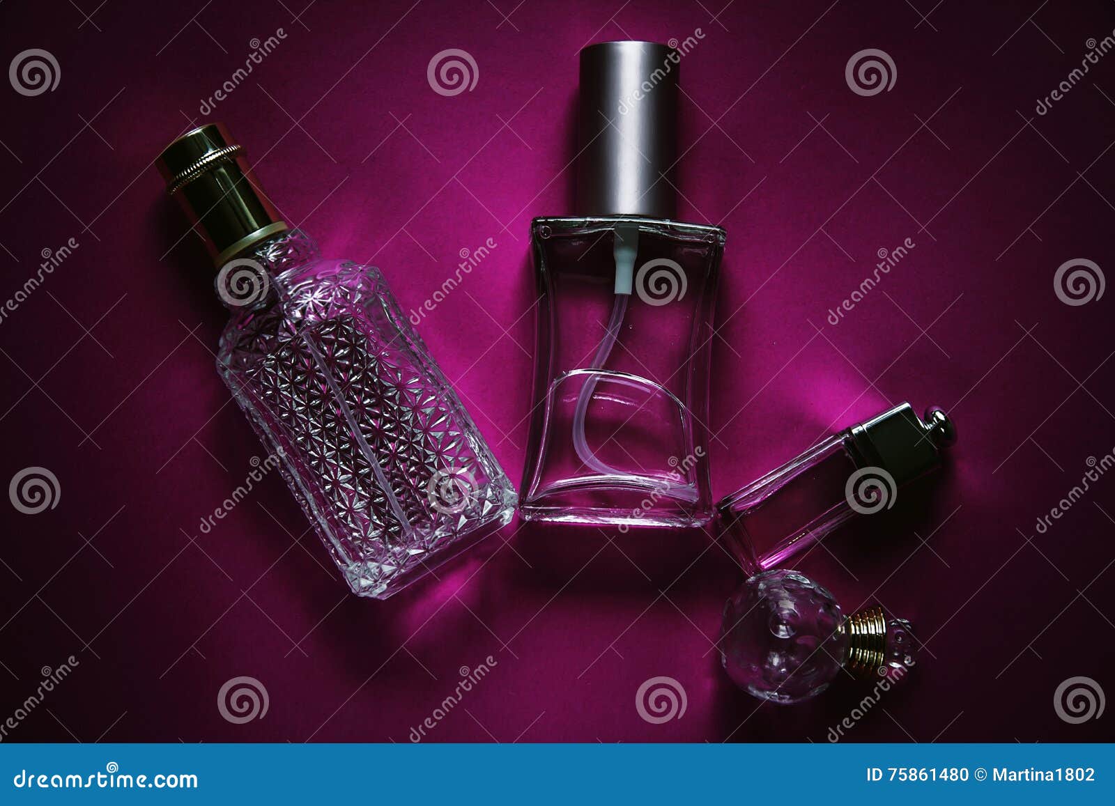 Bottles of Perfume in Pink Background Stock Photo - Image of fragrance ...