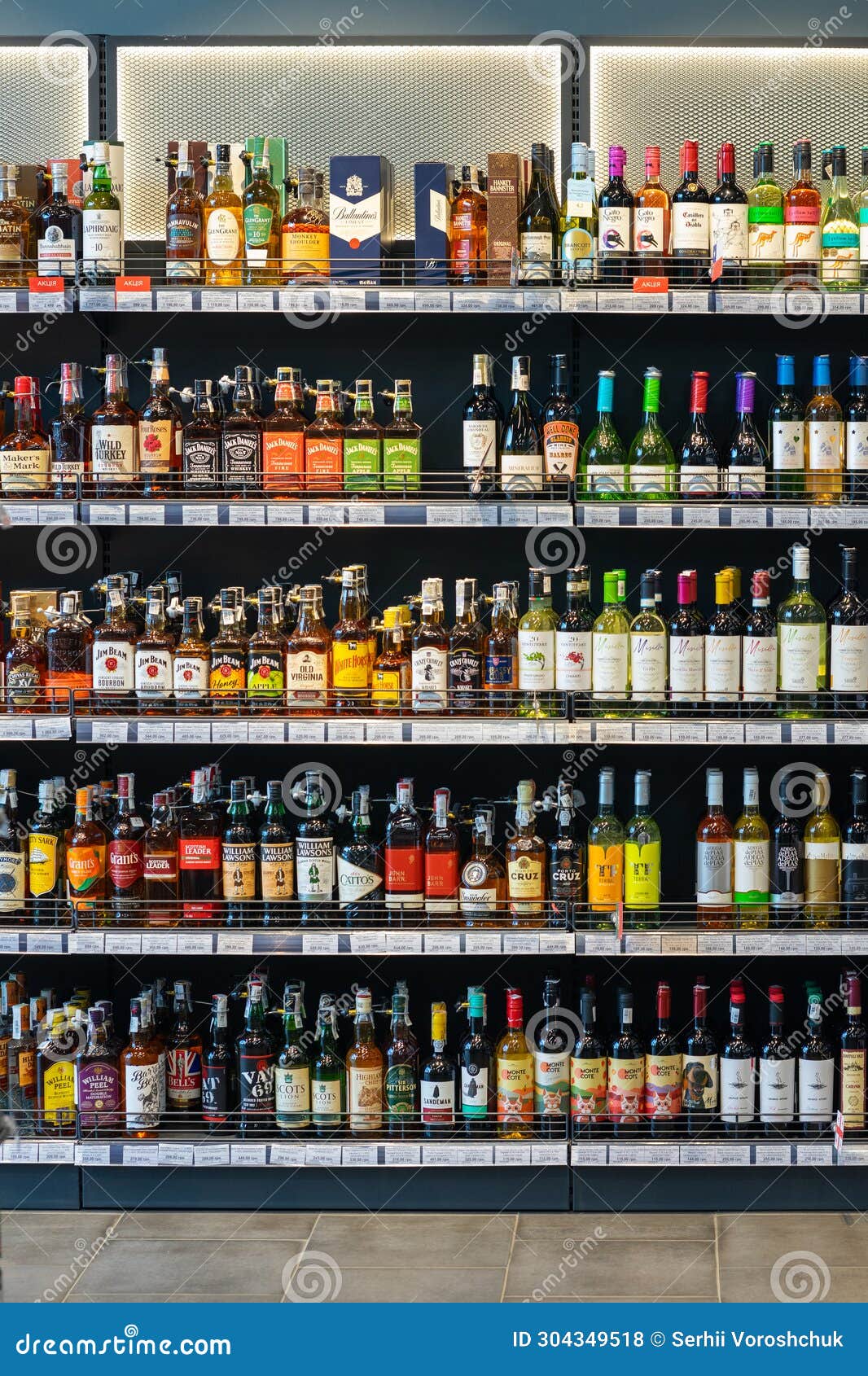 Bottles with Various Alcoholic Beverages on Display in a Store ...