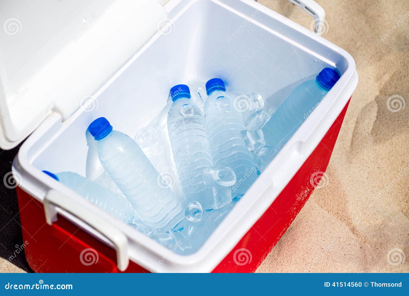 Bottles of Water in the Ice Box on the Beach Stock Photo - Image of ...