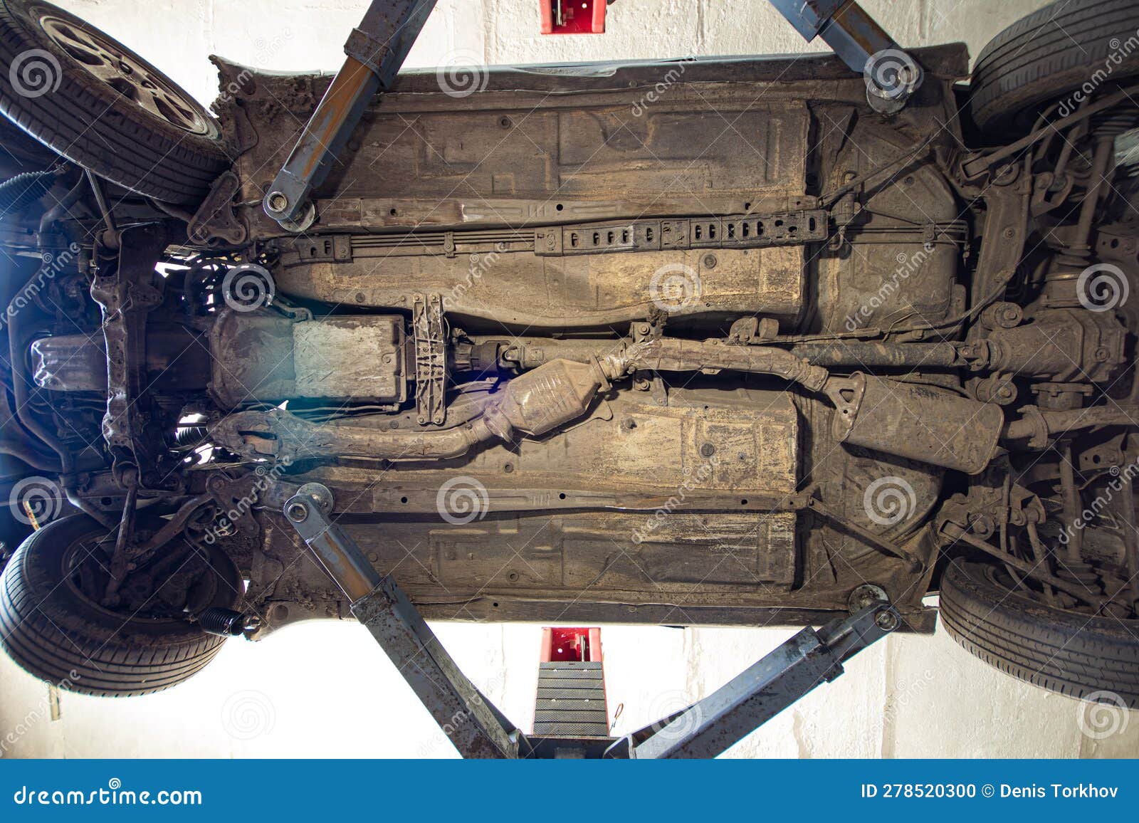 The Bottom of the Car is Raised on a Lift Close-up, the Sides are ...