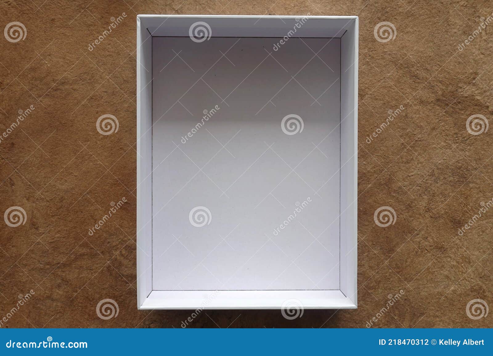 Bottom Half of Empty White Box Against a Brown Background Stock Photo ...