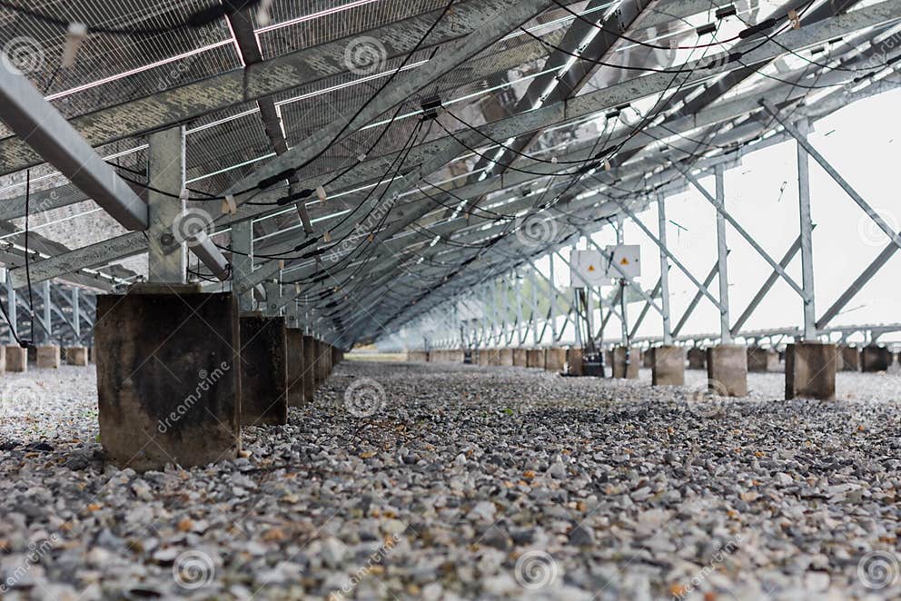Bottom of the Solar Panel with the Rock in the Ground Stock Image ...