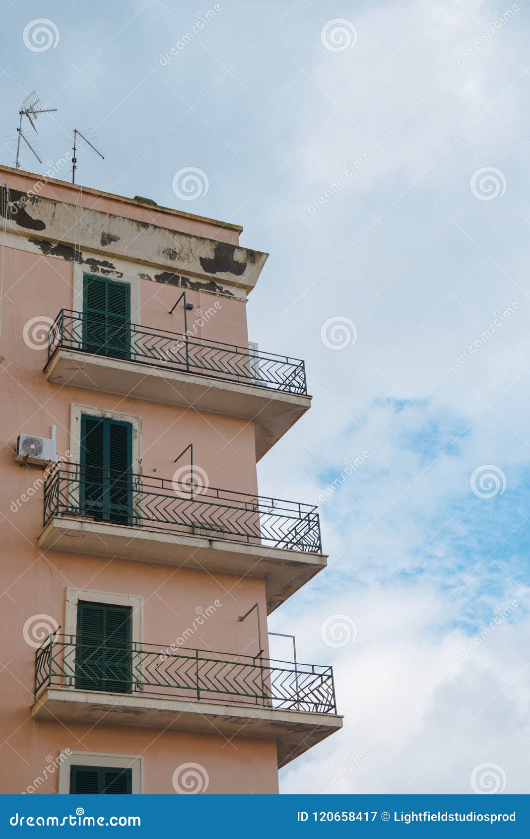 Bottom View of Balconies of Old Building in Front of Cloudy Sky, Anzio ...