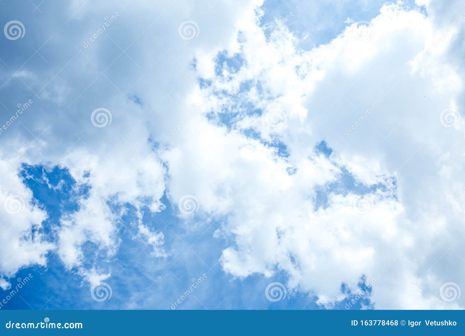 Bottom View of Blue Sky with White Clouds and Sunshine Stock Photo ...