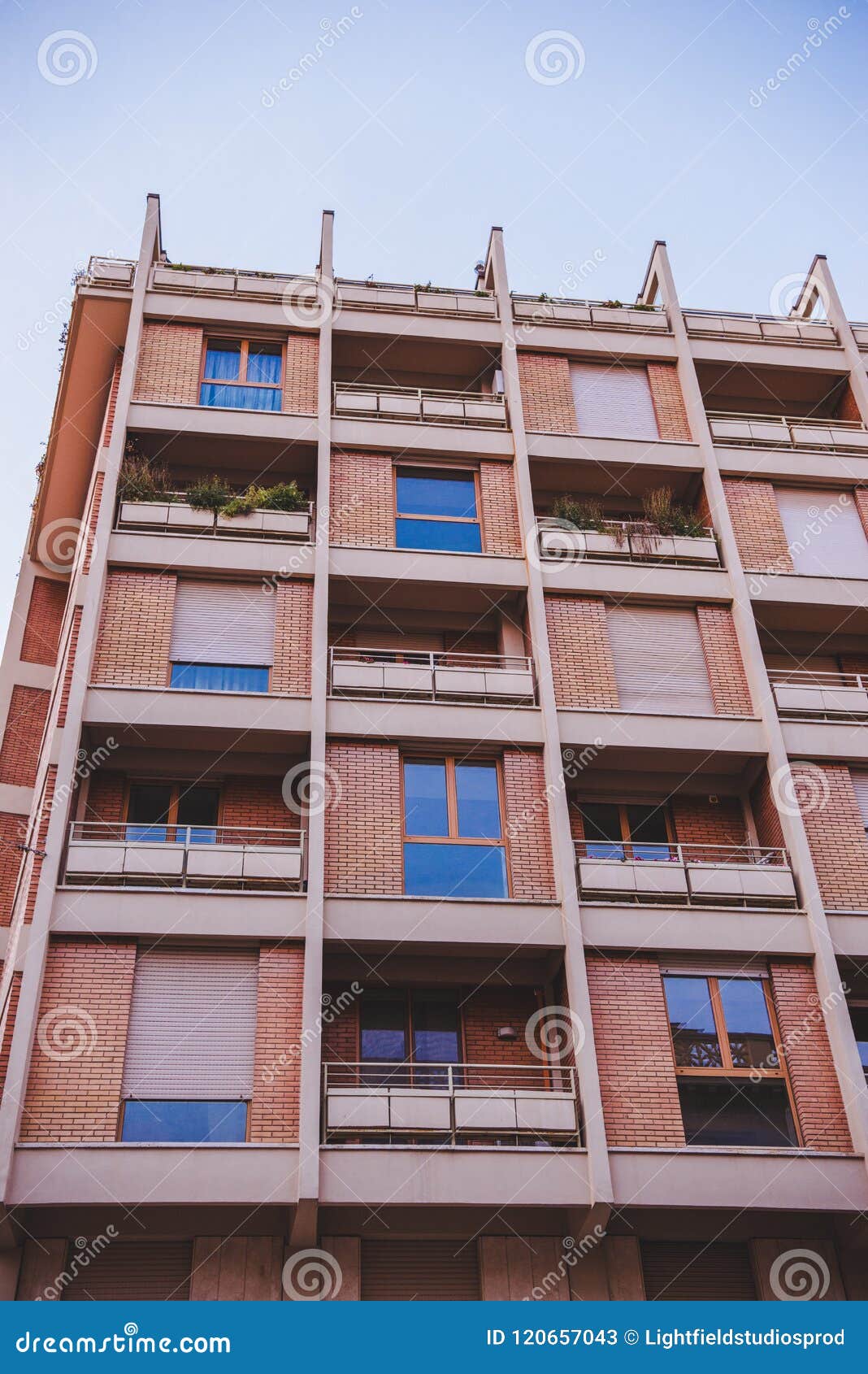 Bottom View of Building with Shuttered and Open Windows Stock Image ...