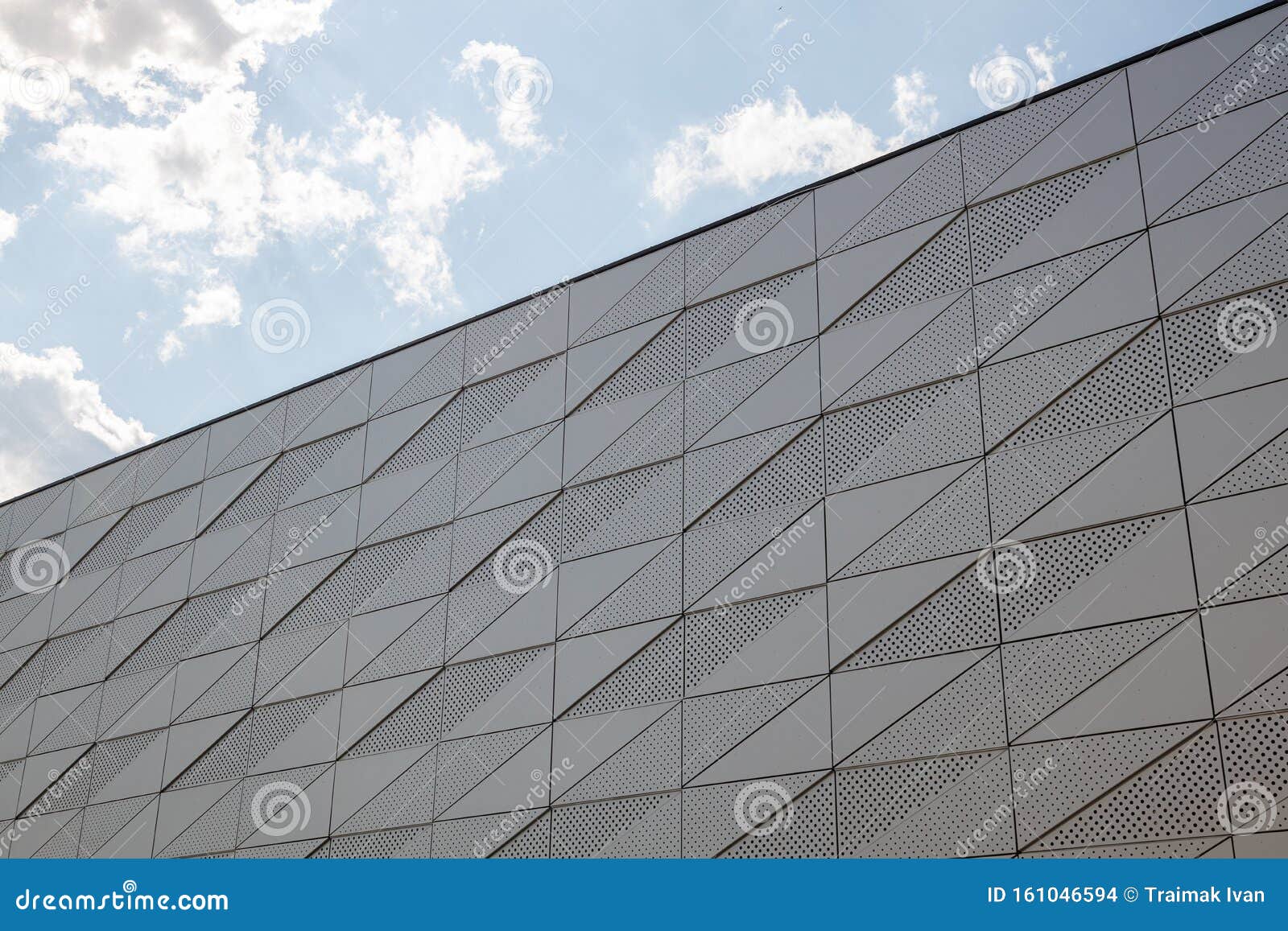 Bottom View of Building Wall with Triangular Pattern and Round Openings ...