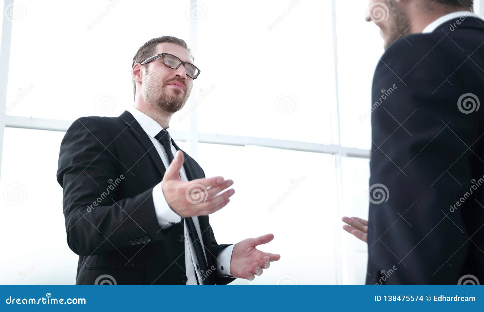 Bottom View.business Colleagues Talking while Standing in Office Stock ...