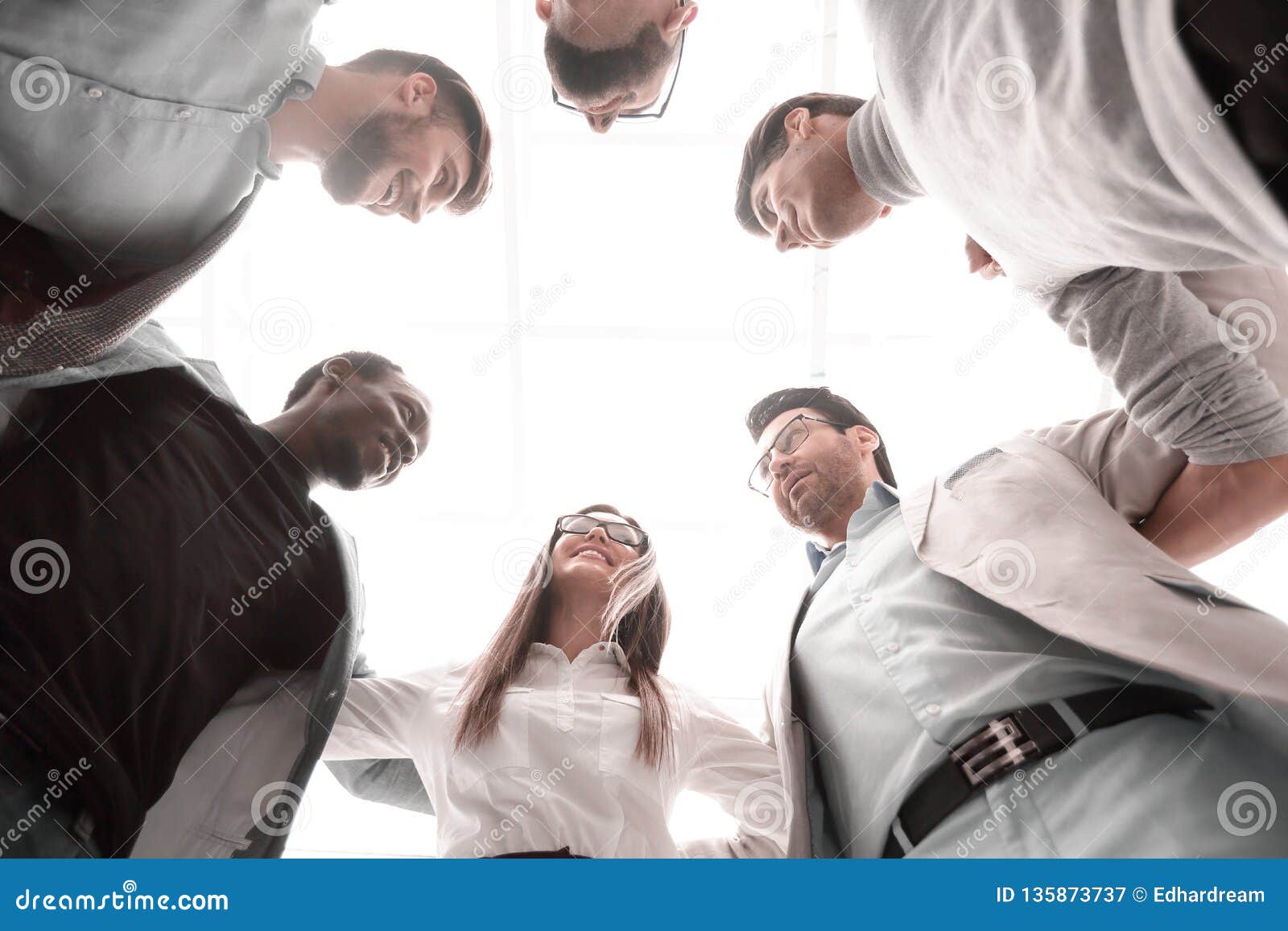 Bottom View.the Business Team Stands Together, Forming a Circle Stock ...