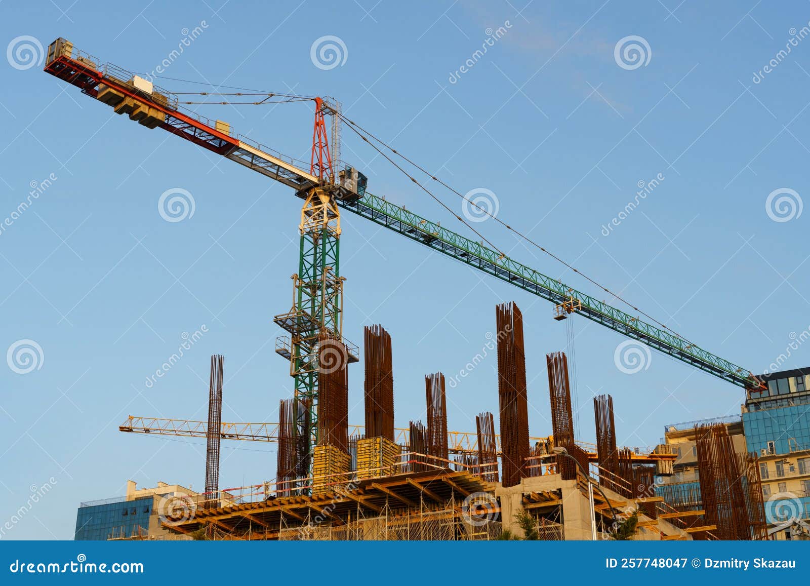 Bottom View of a Crane Working on the Construction of Apartments. Stock ...