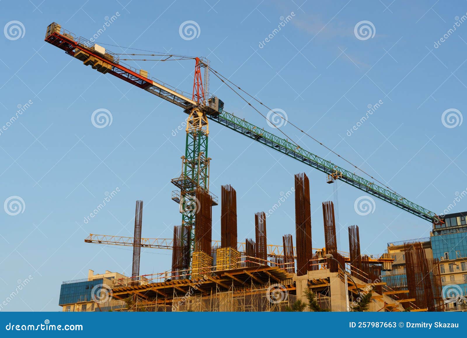 Bottom View of a Crane Working on the Construction of Apartments. Stock ...