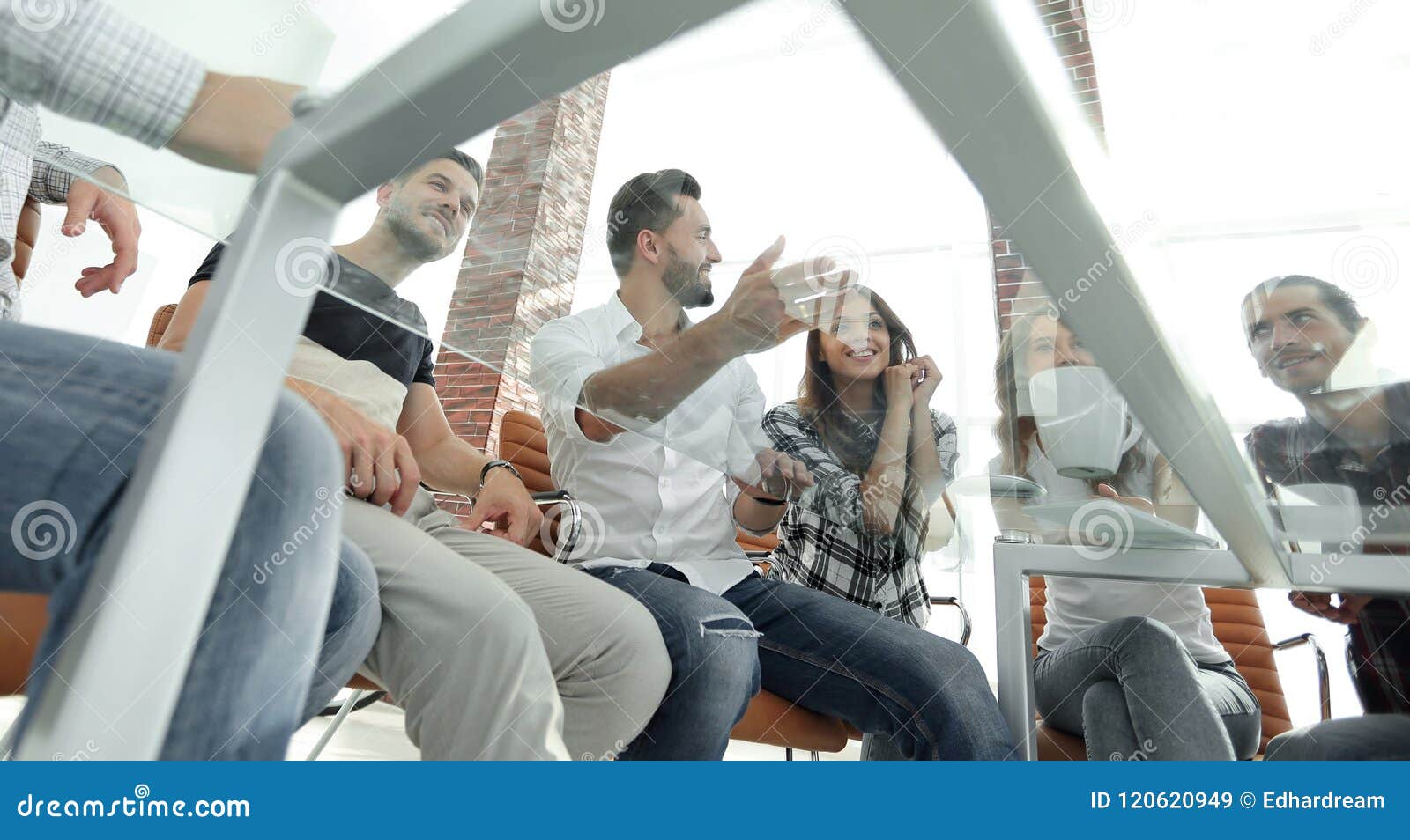 Employees Sitting Behind a Desk Stock Image - Image of creative, office ...