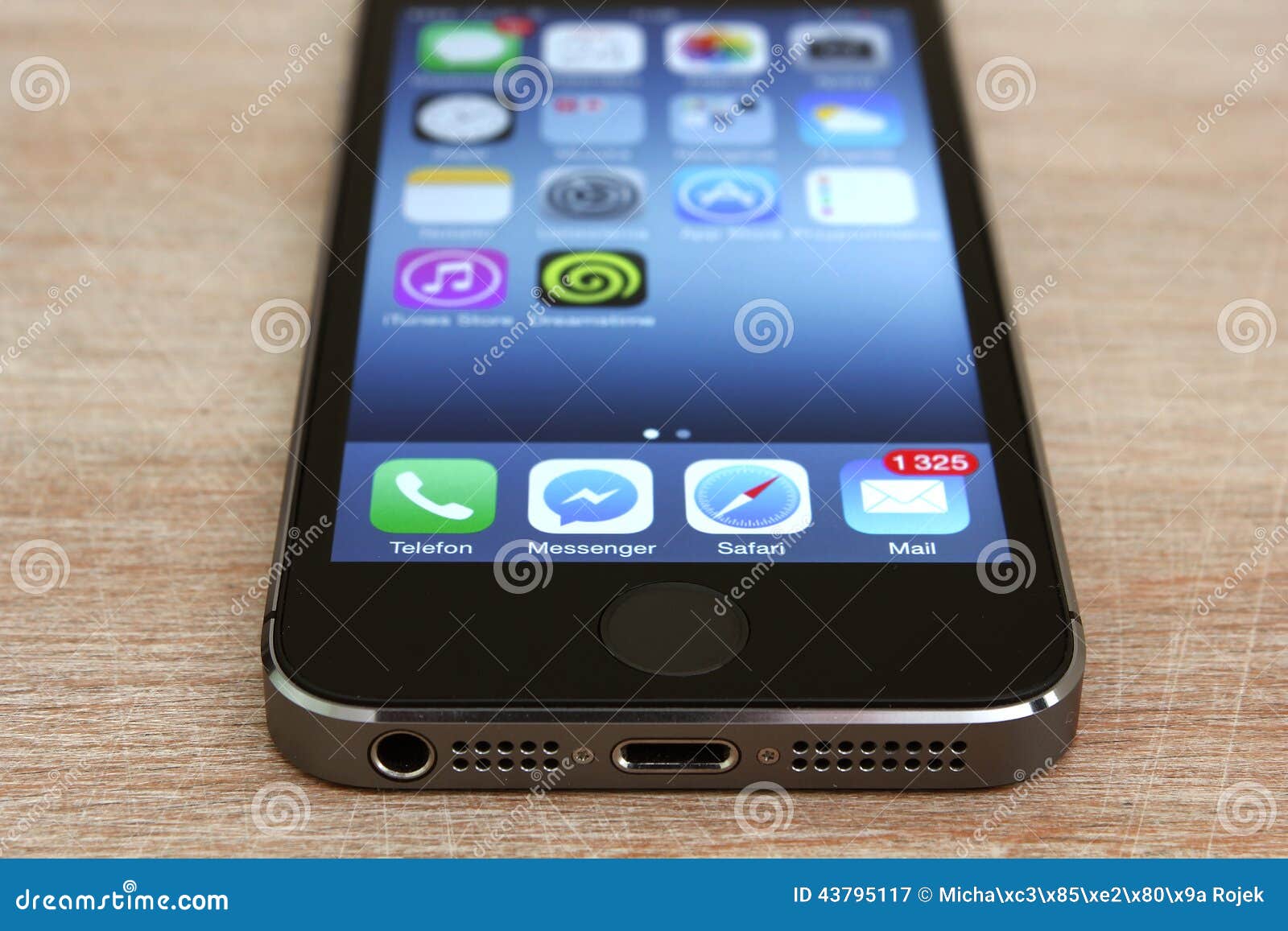 Bottom View of IPhone 5s Lying on Wooden Desk Editorial Photography ...