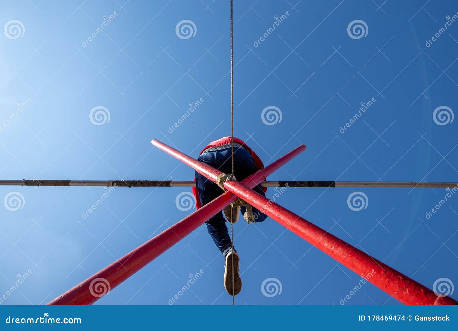 Bottom View of a Man Tightrope Walker with a Pole Stock Photo - Image ...