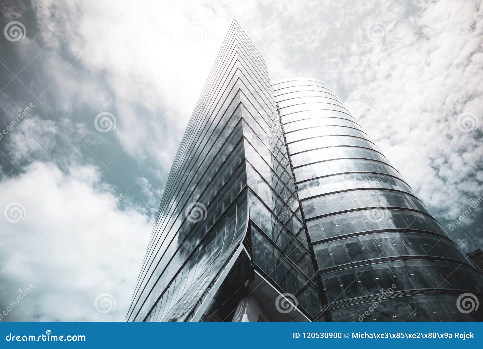 Bottom View of Modern Skyscraper Stock Photo - Image of dusk, light ...