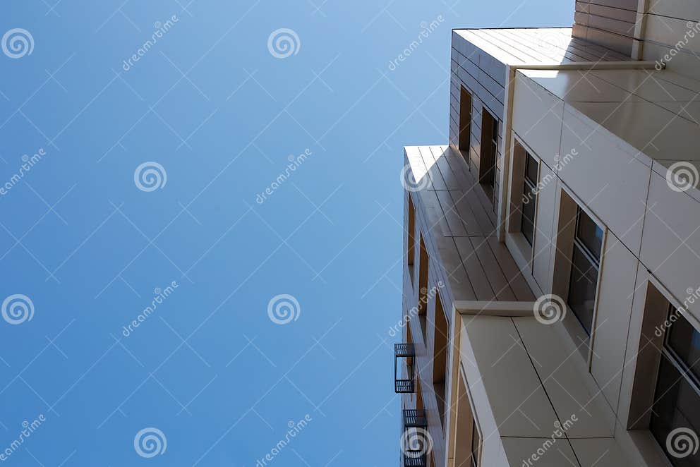 Bottom View of a Multi-storey Building and the Sky Background. Copy ...