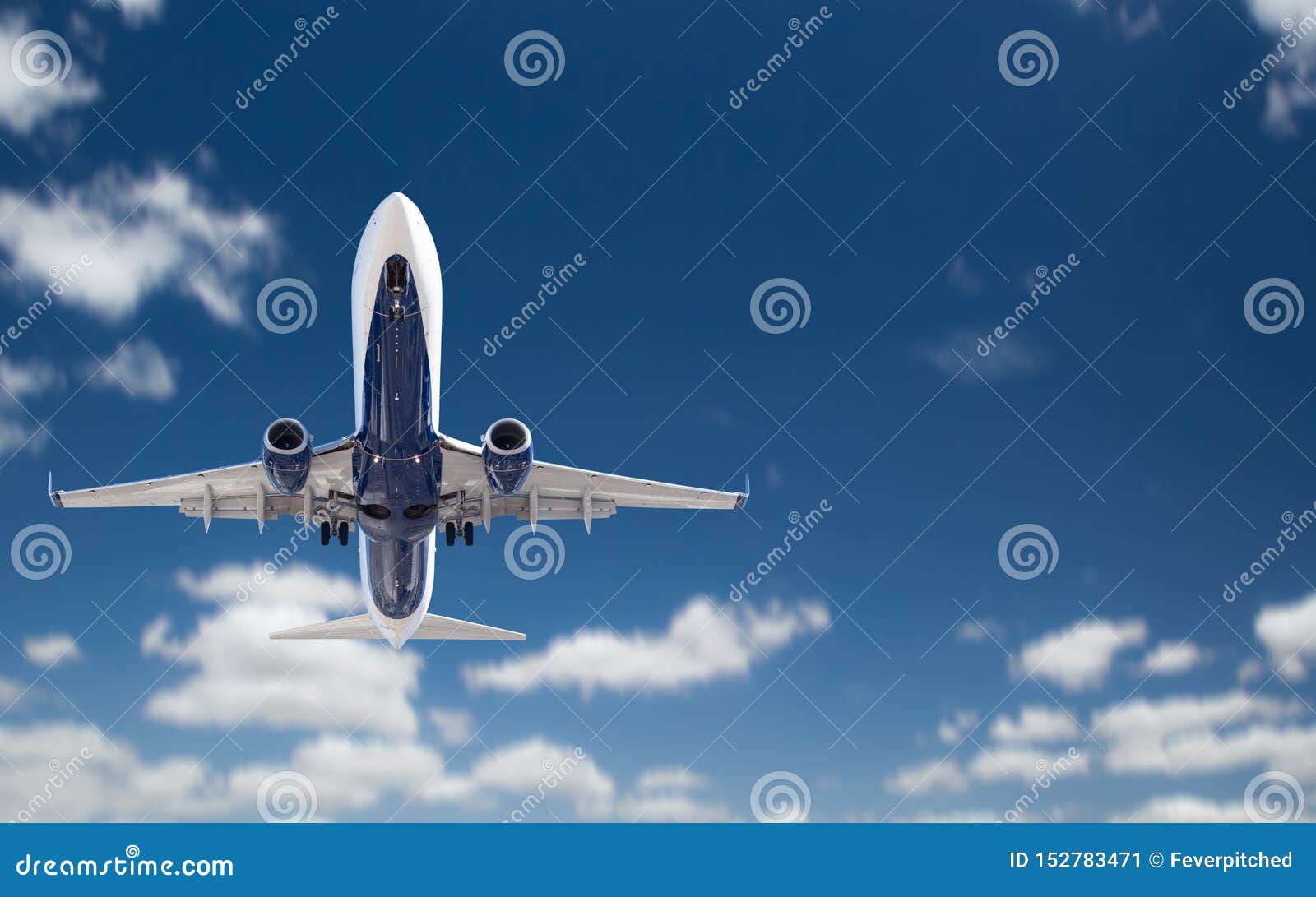 Bottom View of Passenger Airplane Flying in the Blue Sky Stock Image ...