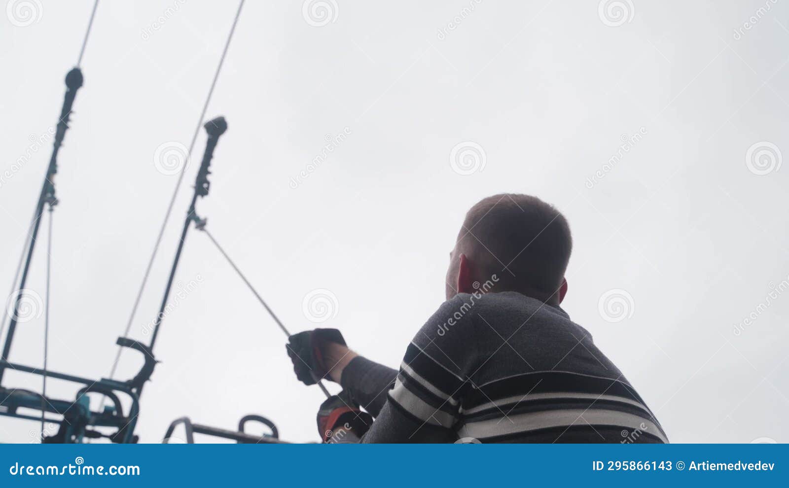 Bottom View of Professional Driver Stands at Back Side of Trolleybus ...