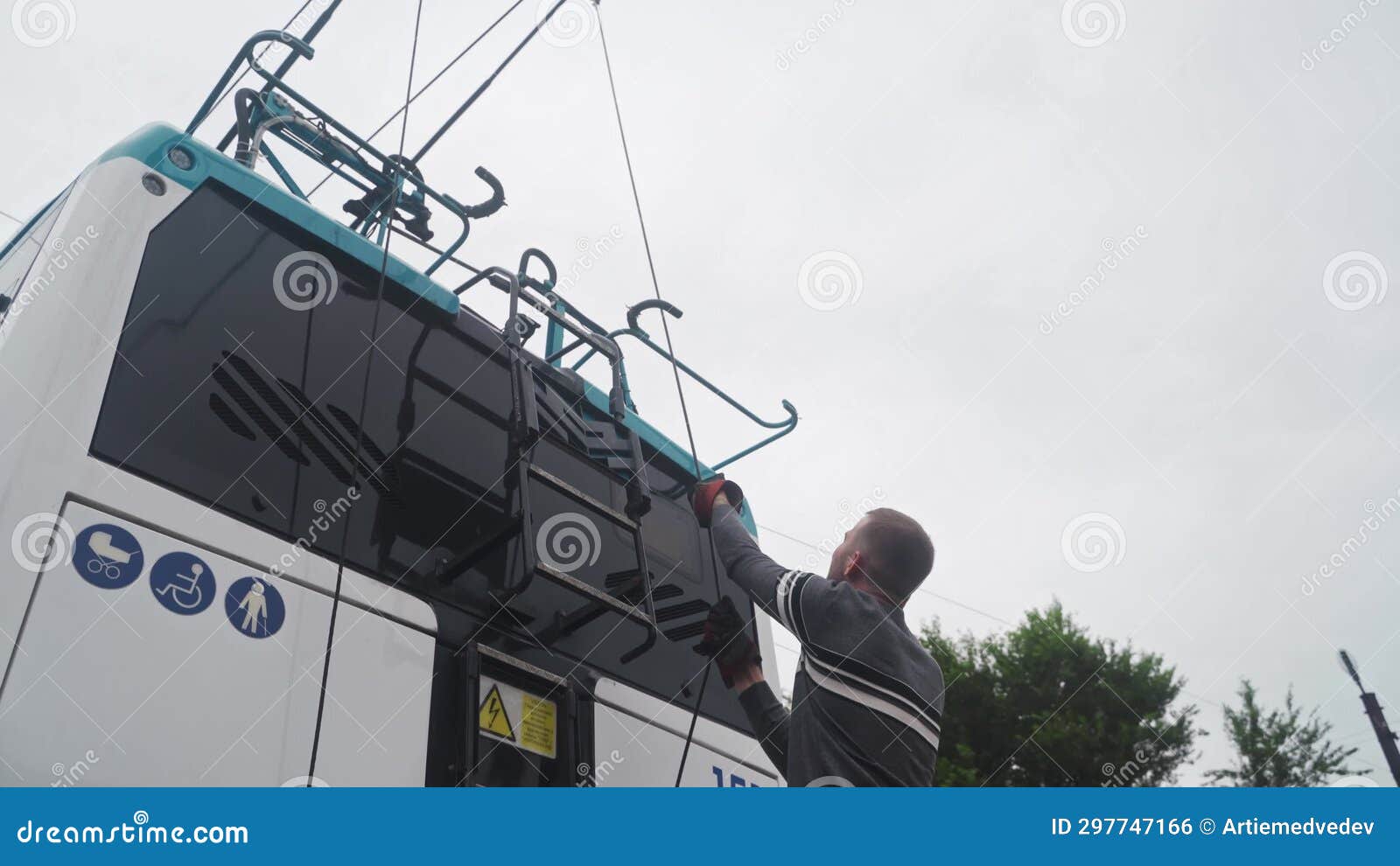 Bottom View of Professional Driver Stands at Back Side of Trolleybus ...