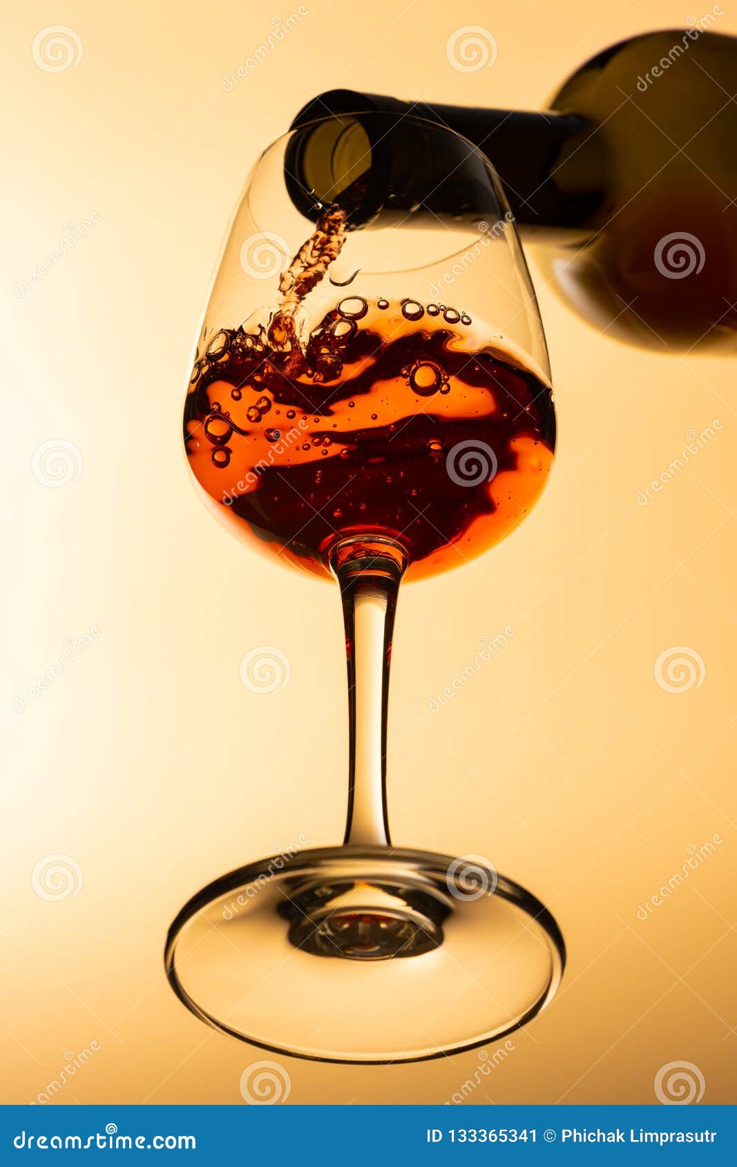 Bottom View of Red Wine Being Poured from the Wine Bottle Stock Image ...