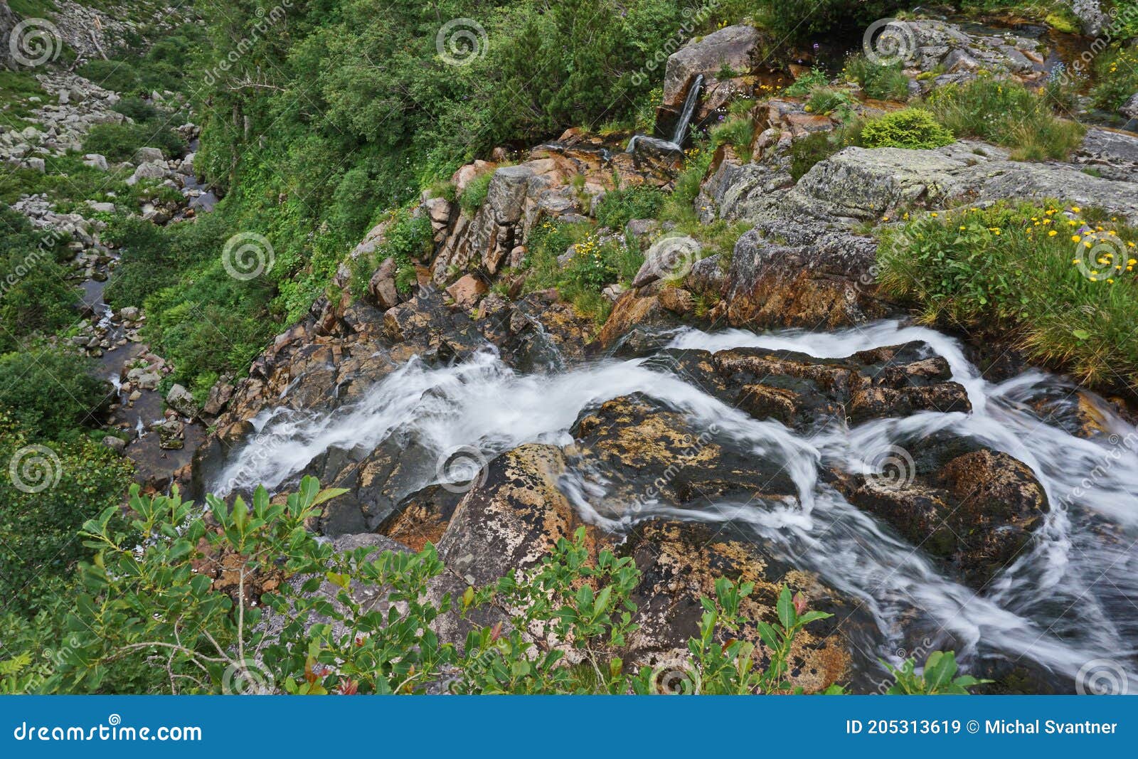 Top View of a Mountain Stream with Waterfalls Falling Down To a Rocky ...